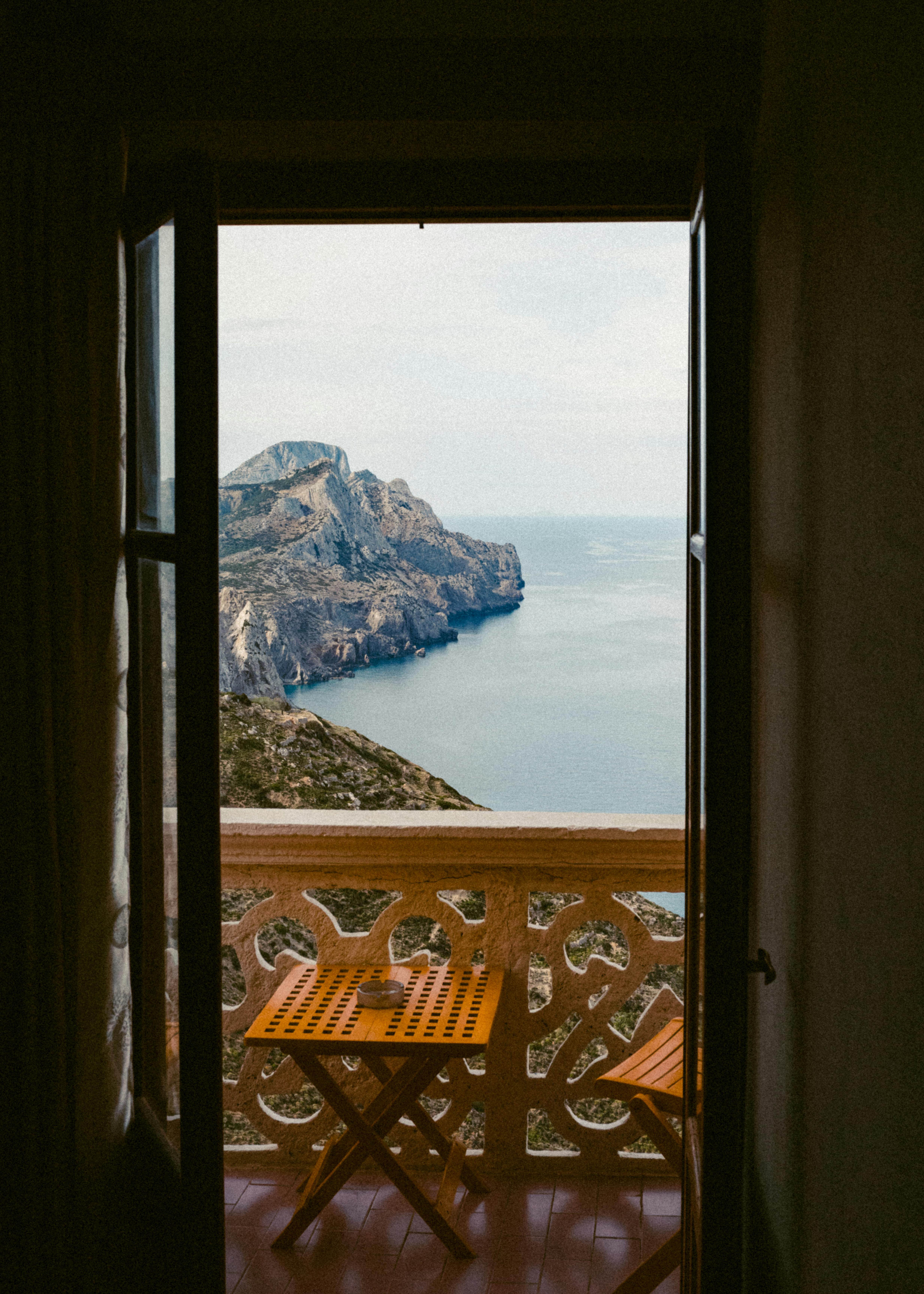View of a Cliff and Sea from the Balcony of an Apartment · Free Stock Photo