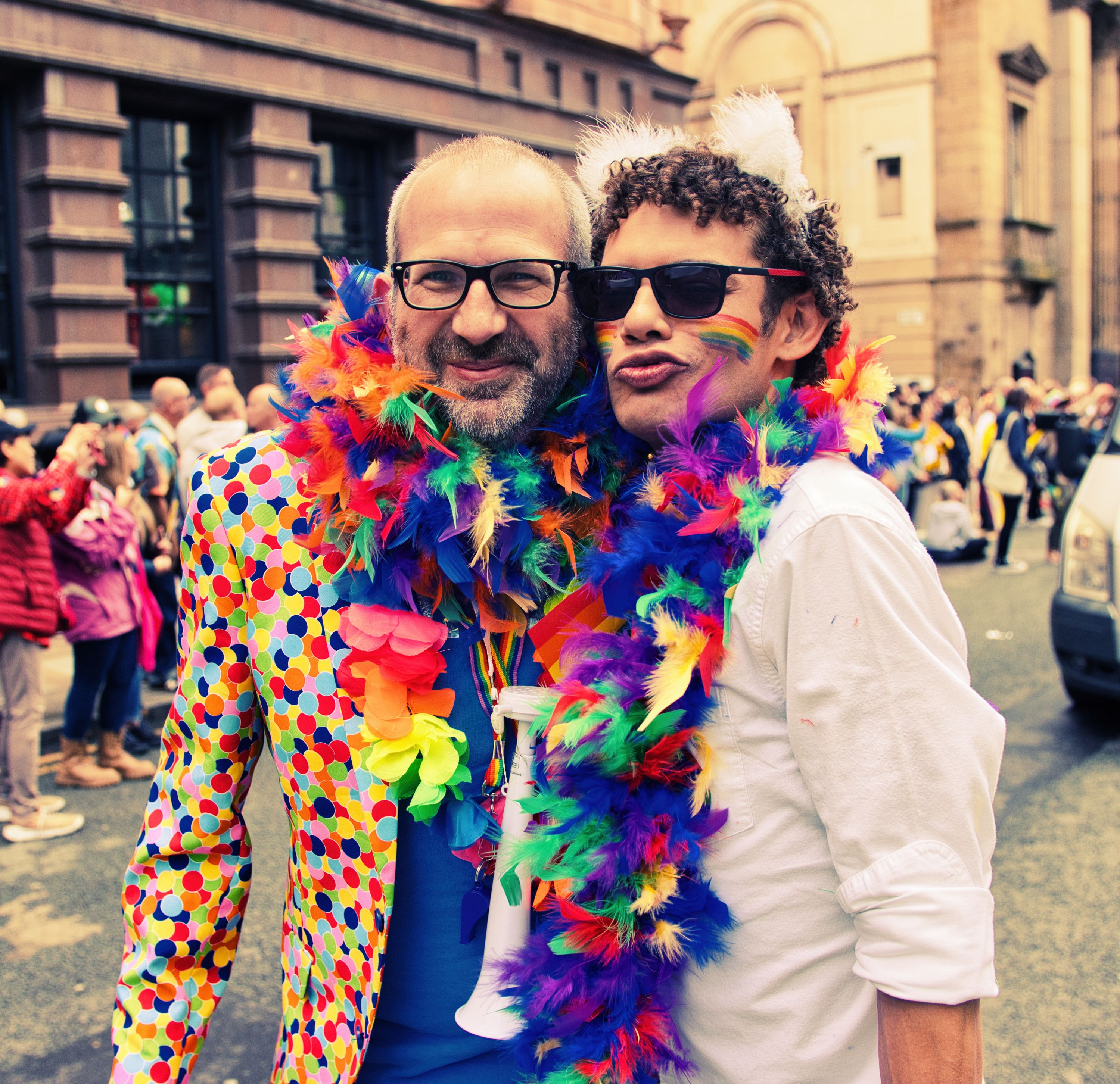 Smiling Men Together at Parade · Free Stock Photo