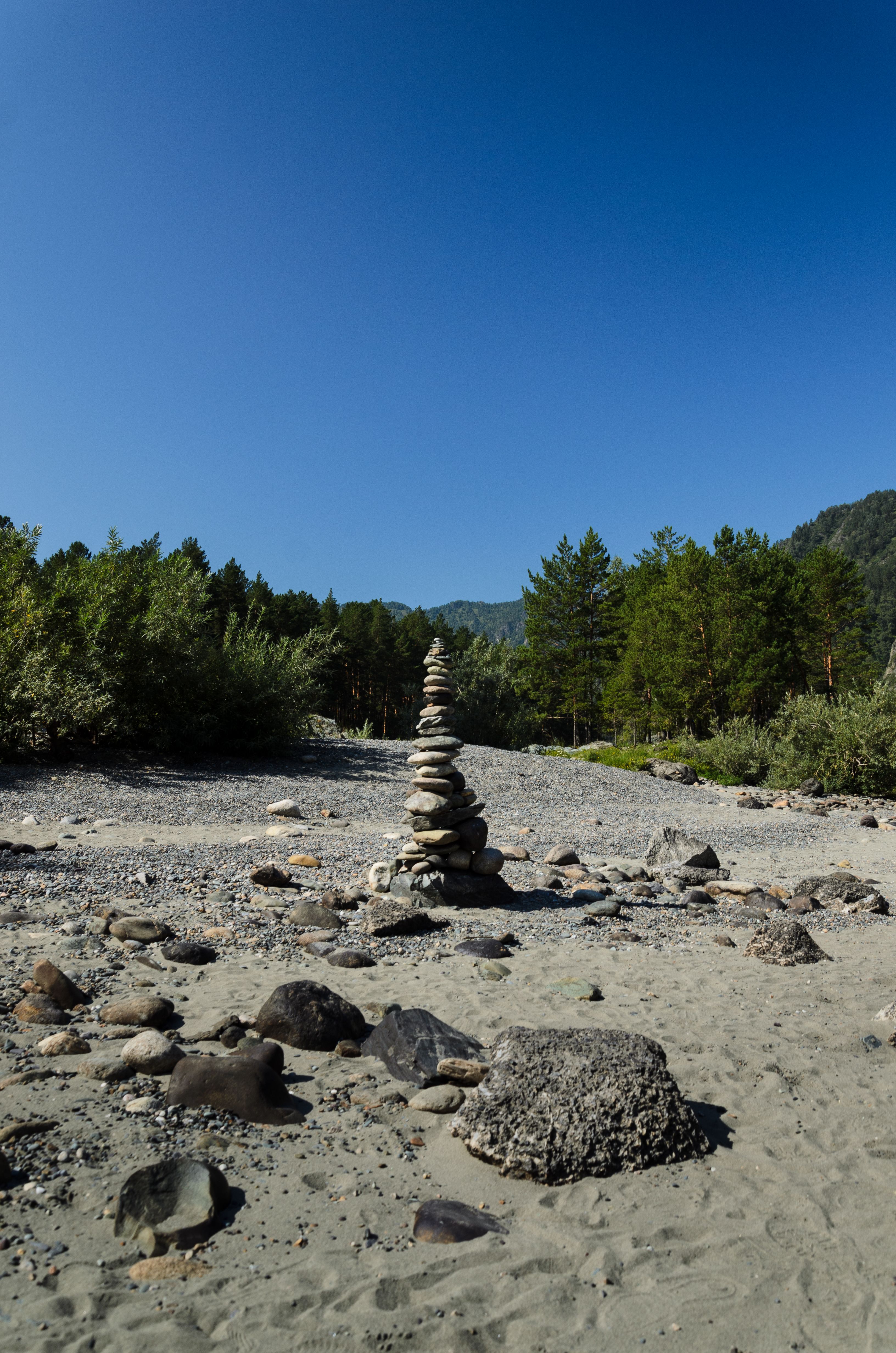Large and Small Stone Cairns in Mountains · Free Stock Photo
