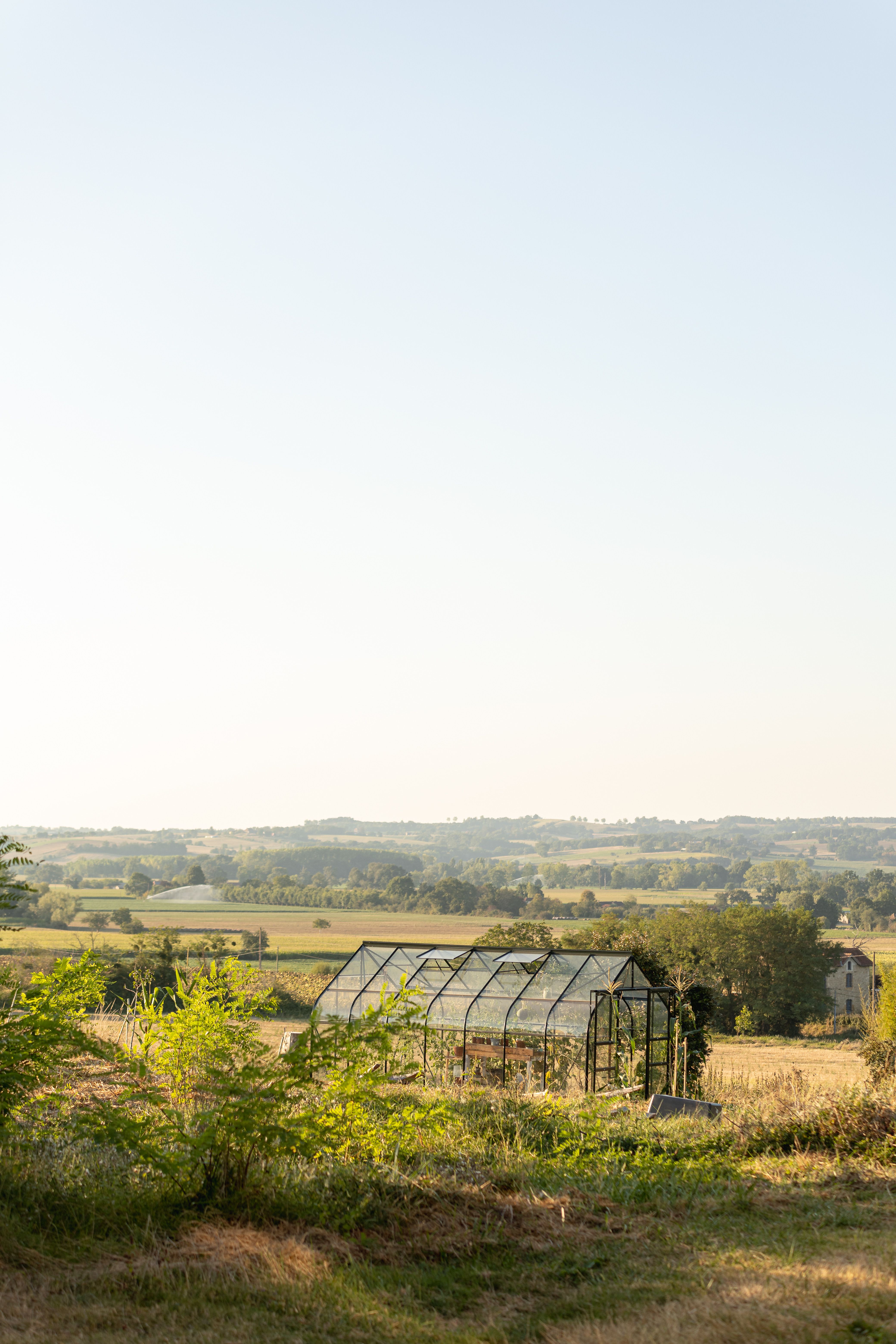 Greenhouse on Plains in Countryside · Free Stock Photo