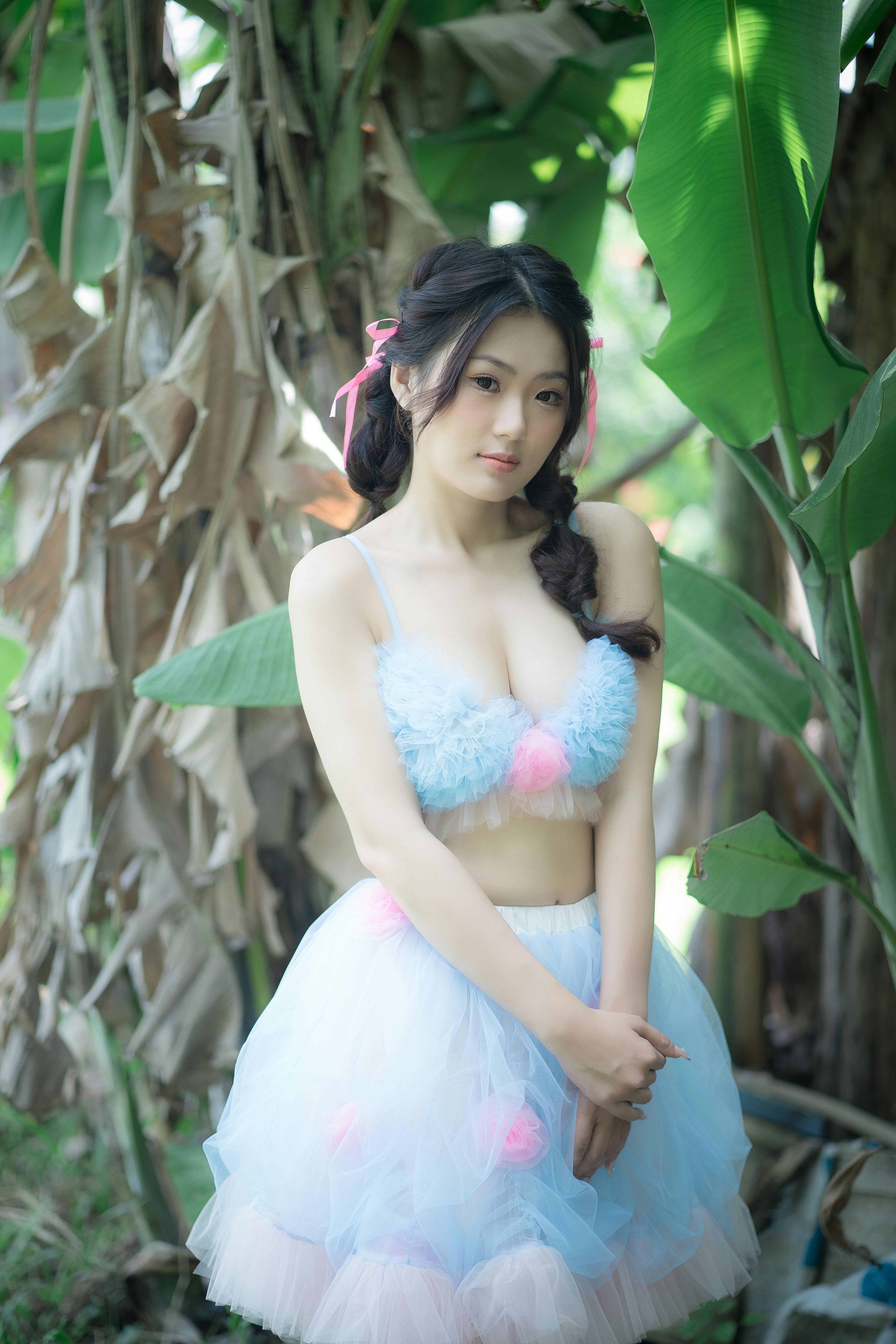 Woman Standing in Bra and Skirt · Free Stock Photo