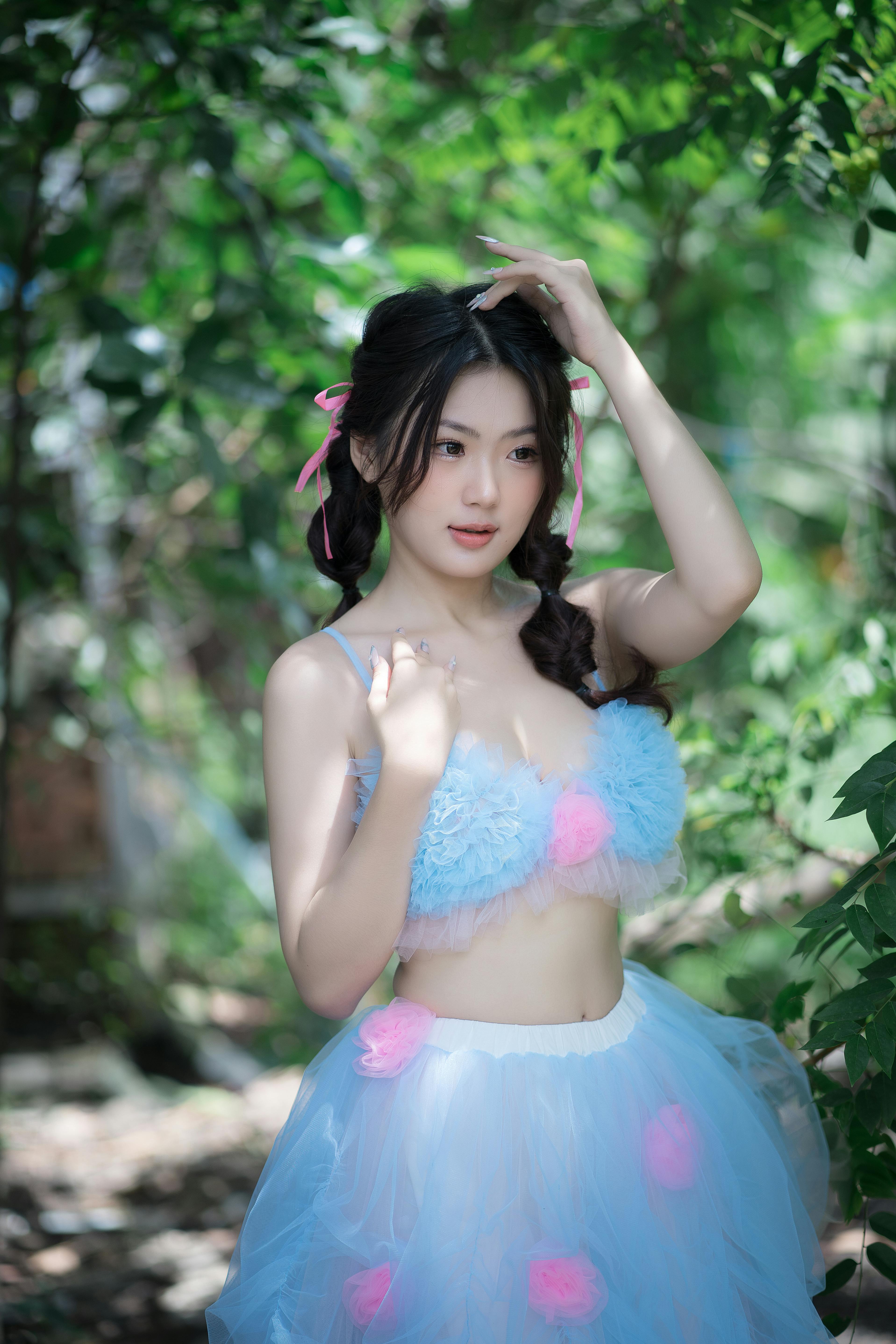 Portrait of Woman in Bra and Skirt · Free Stock Photo