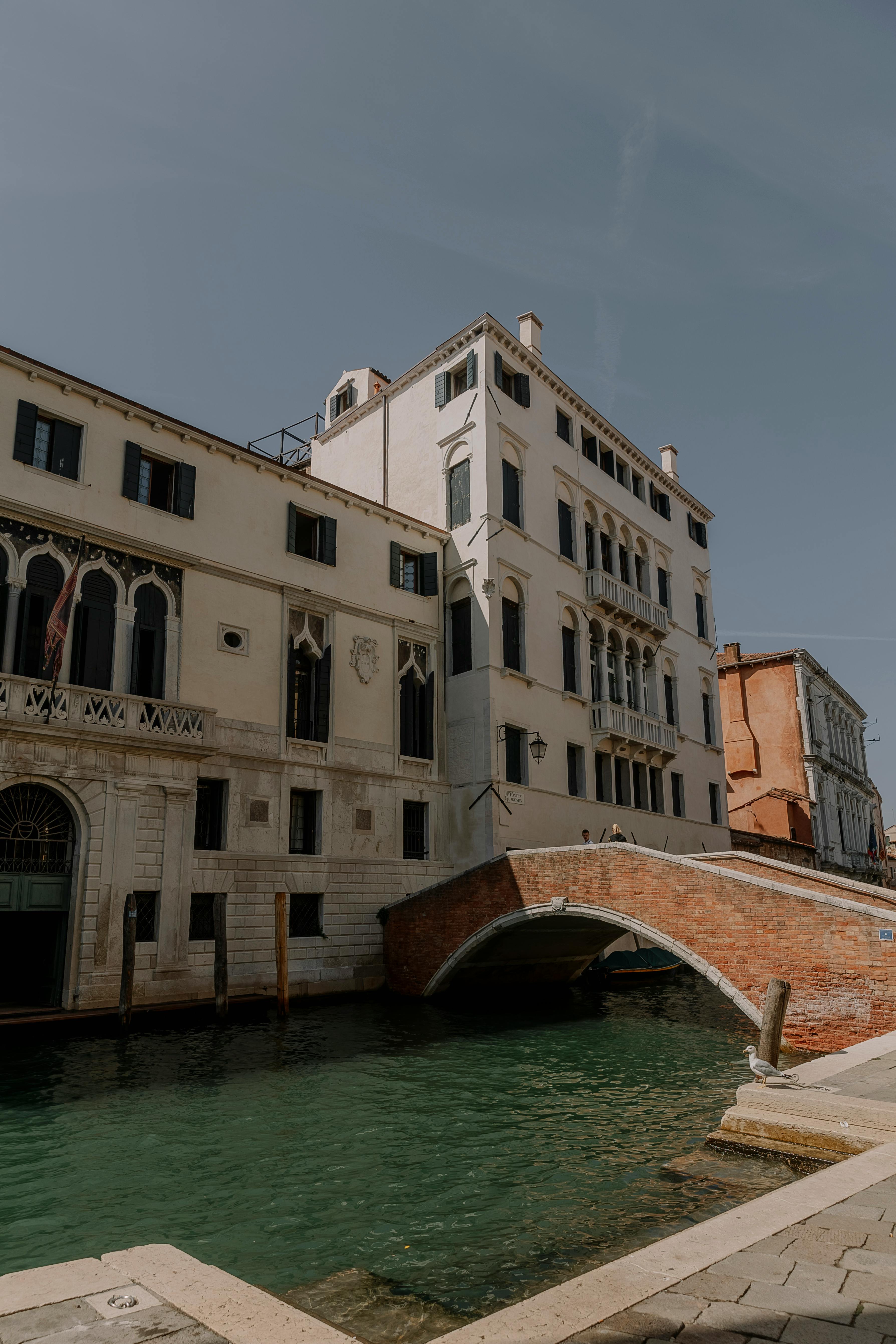 Red Brick Arched Bridge over Canal in Venice, Italy · Free Stock Photo