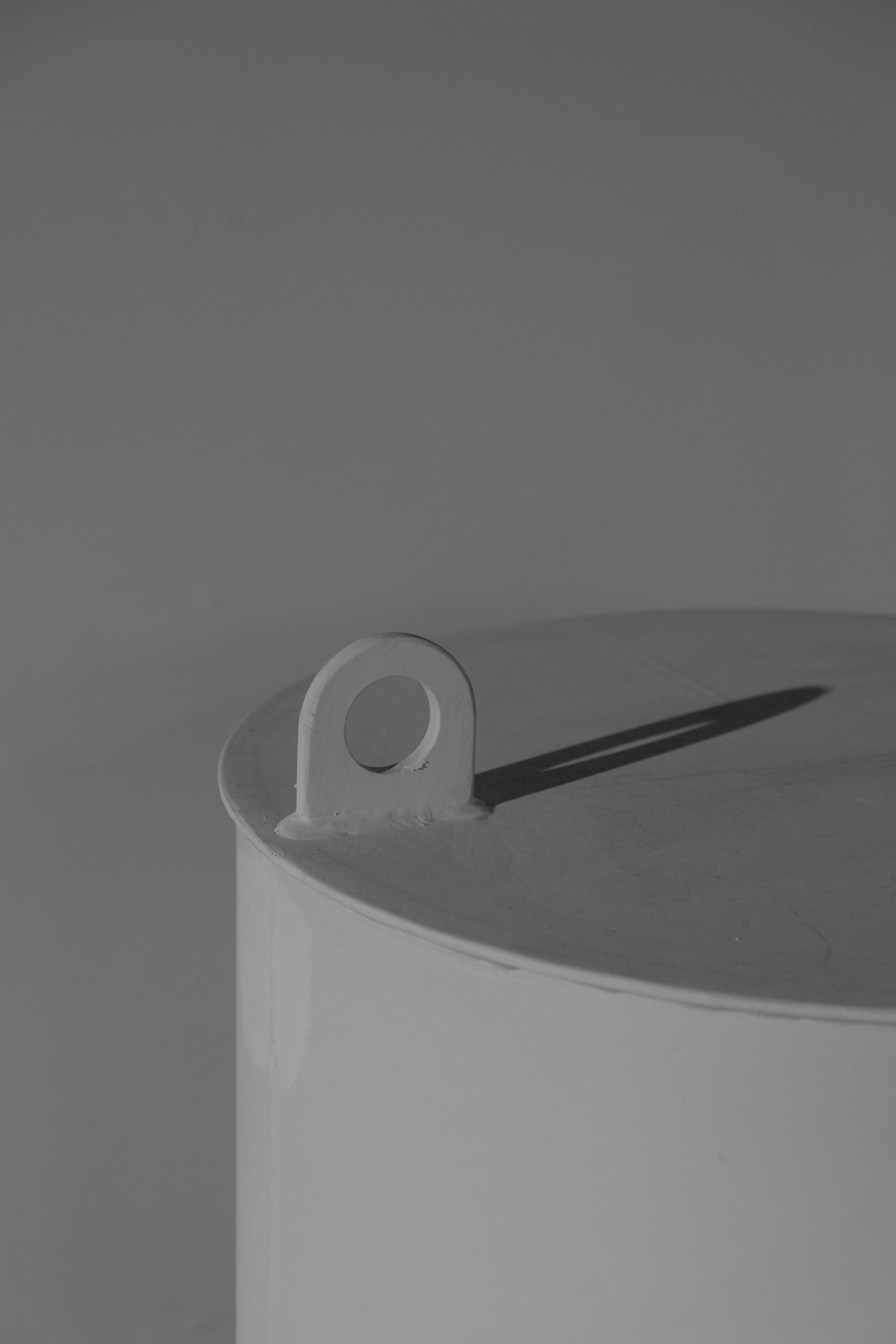 A black and white photo of a white object · Free Stock Photo
