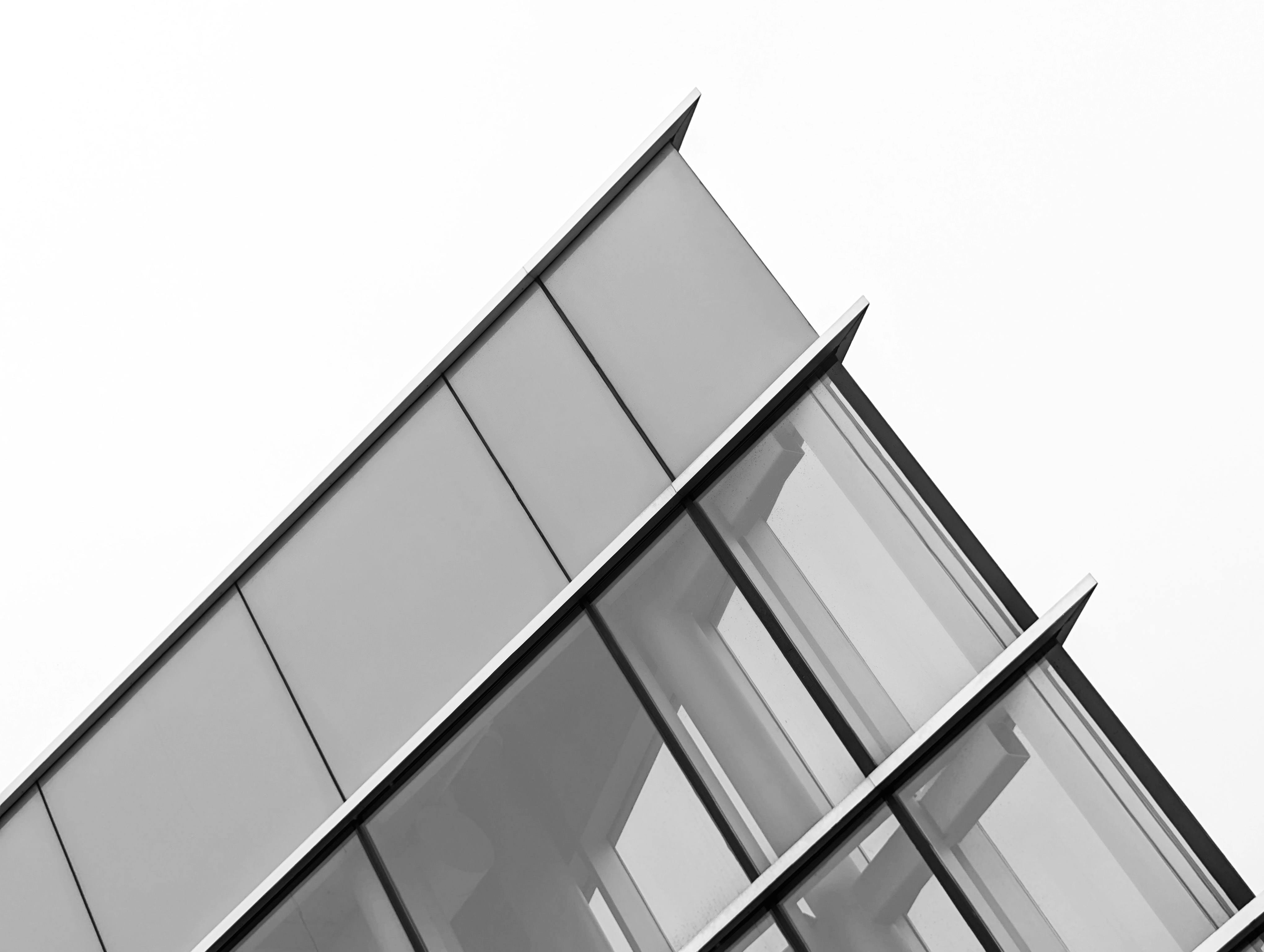 Modern Glass Building in Black and White · Free Stock Photo
