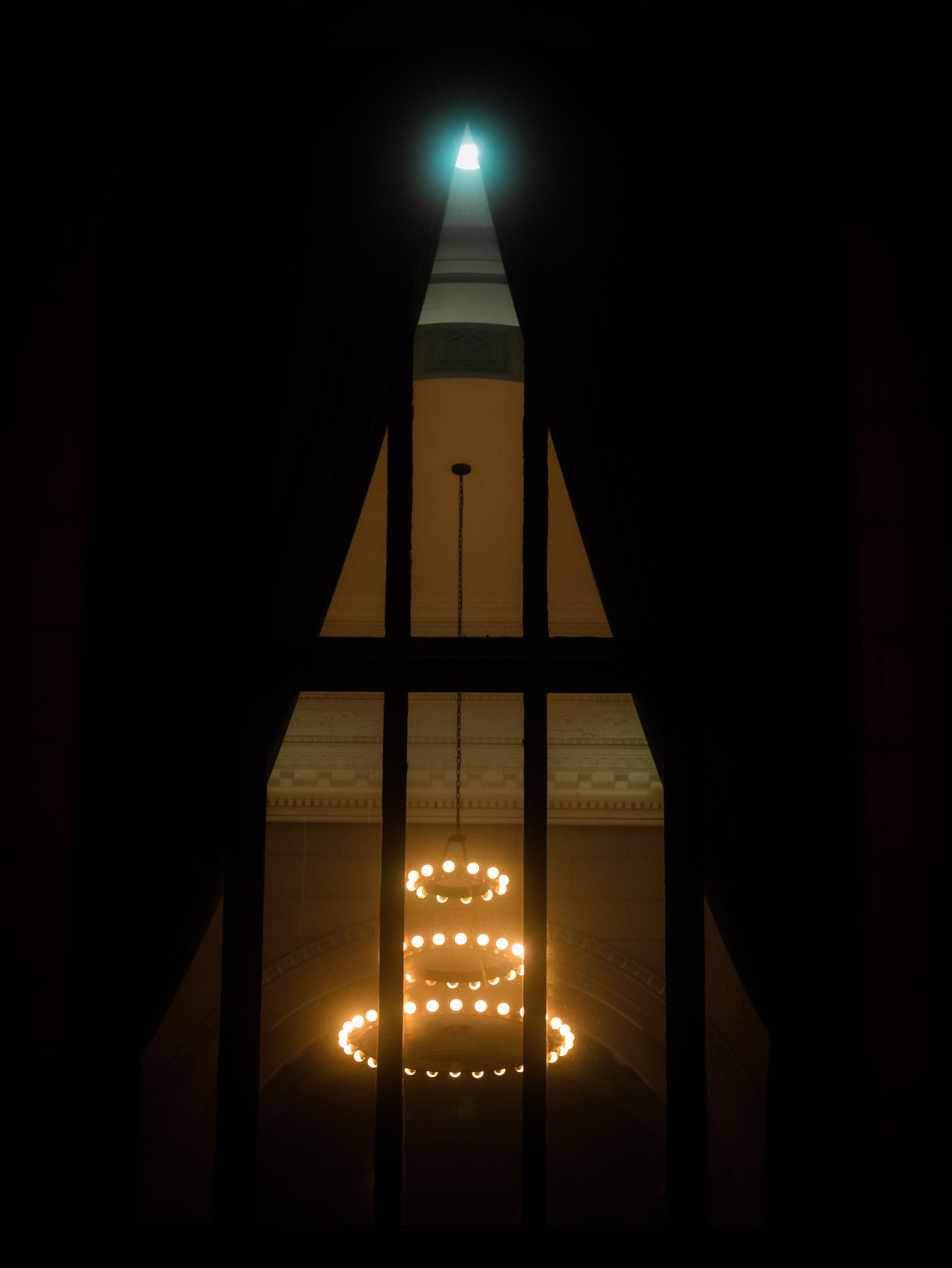 Photo of a Chandelier behind the Window · Free Stock Photo