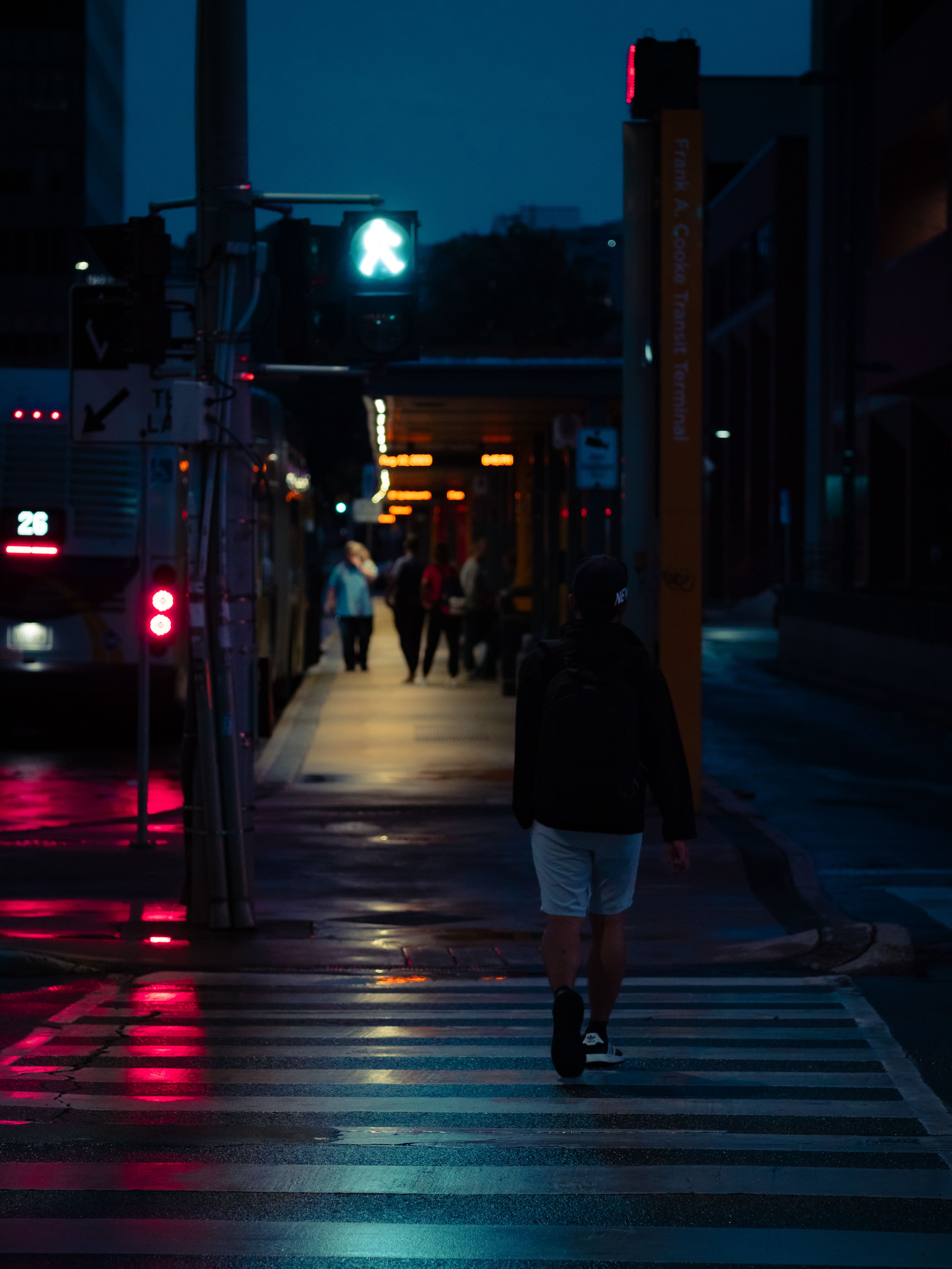 Person Crossing the Street at Night · Free Stock Photo