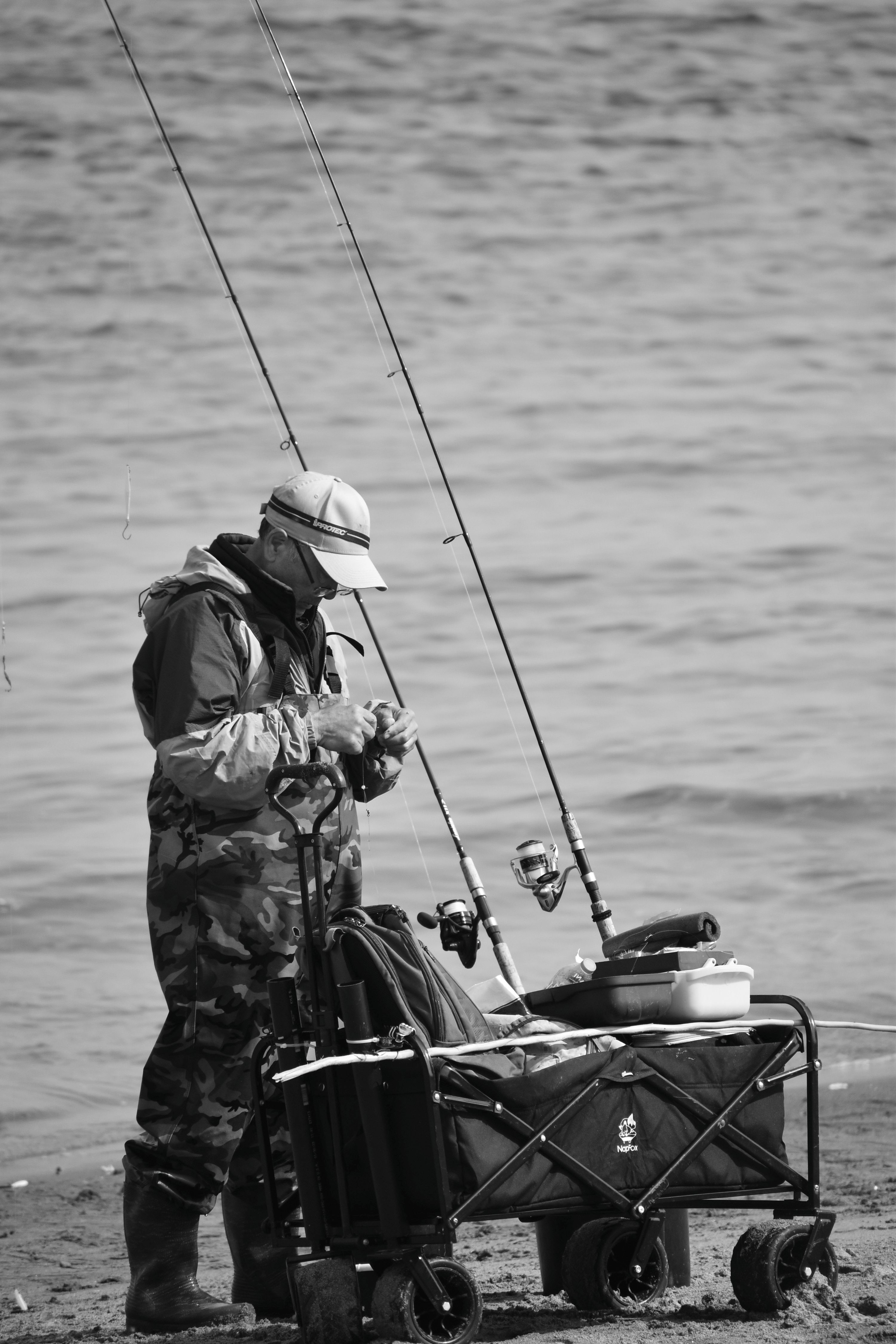Women Wearing Rubber Boots Holding Fishing Rods · Free Stock Photo