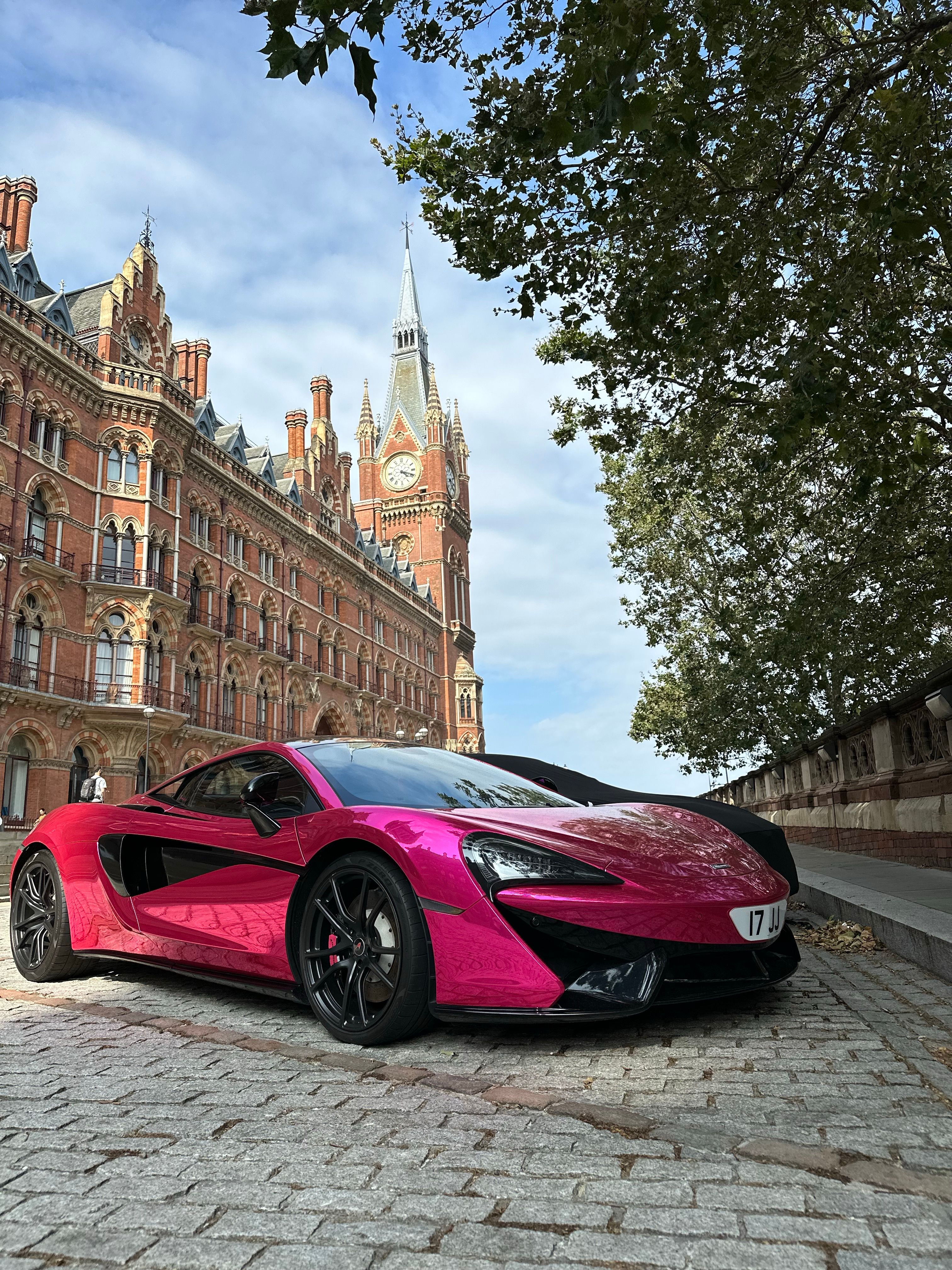 Red Maclaren on a Street · Free Stock Photo