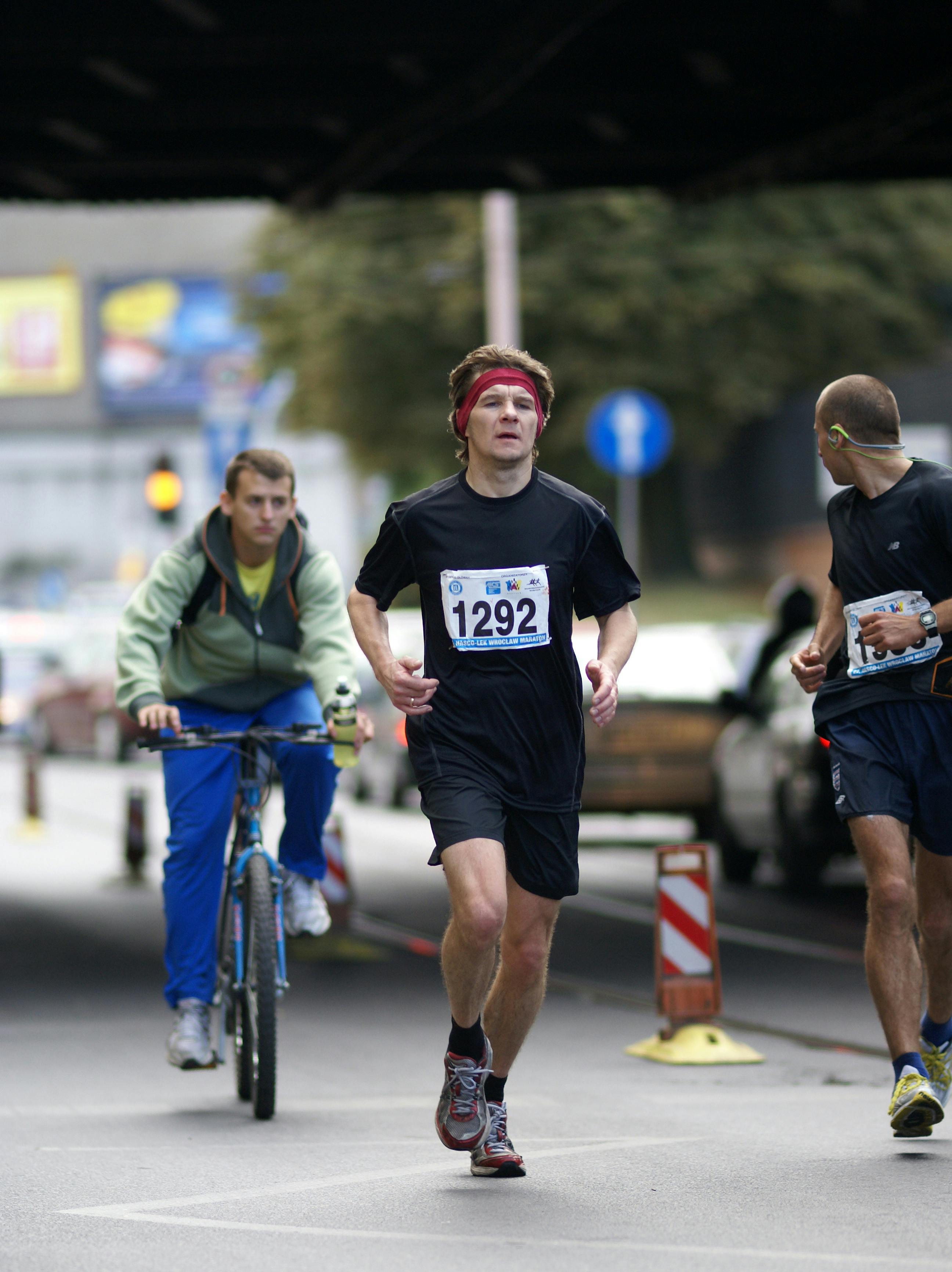 Men Running a Marathon on the Street in City · Free Stock Photo