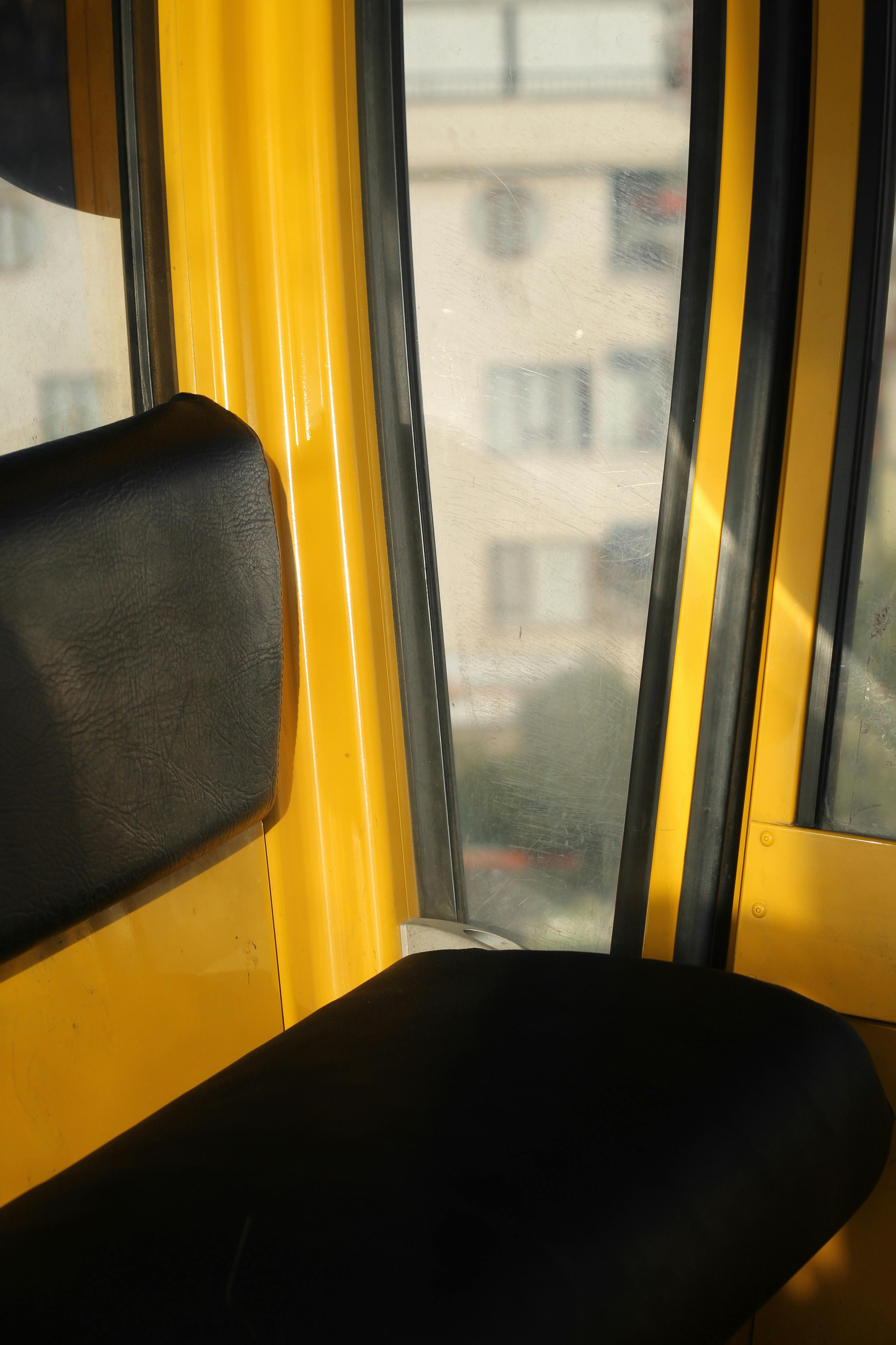 Empty Seats behind Bus Window · Free Stock Photo