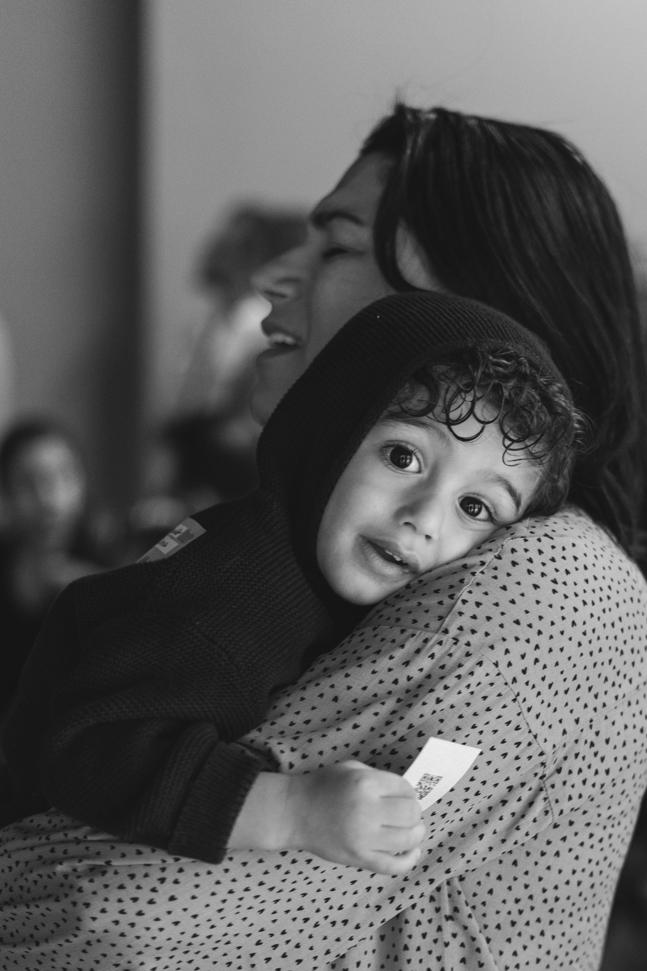 Mother Embracing Child · Free Stock Photo
