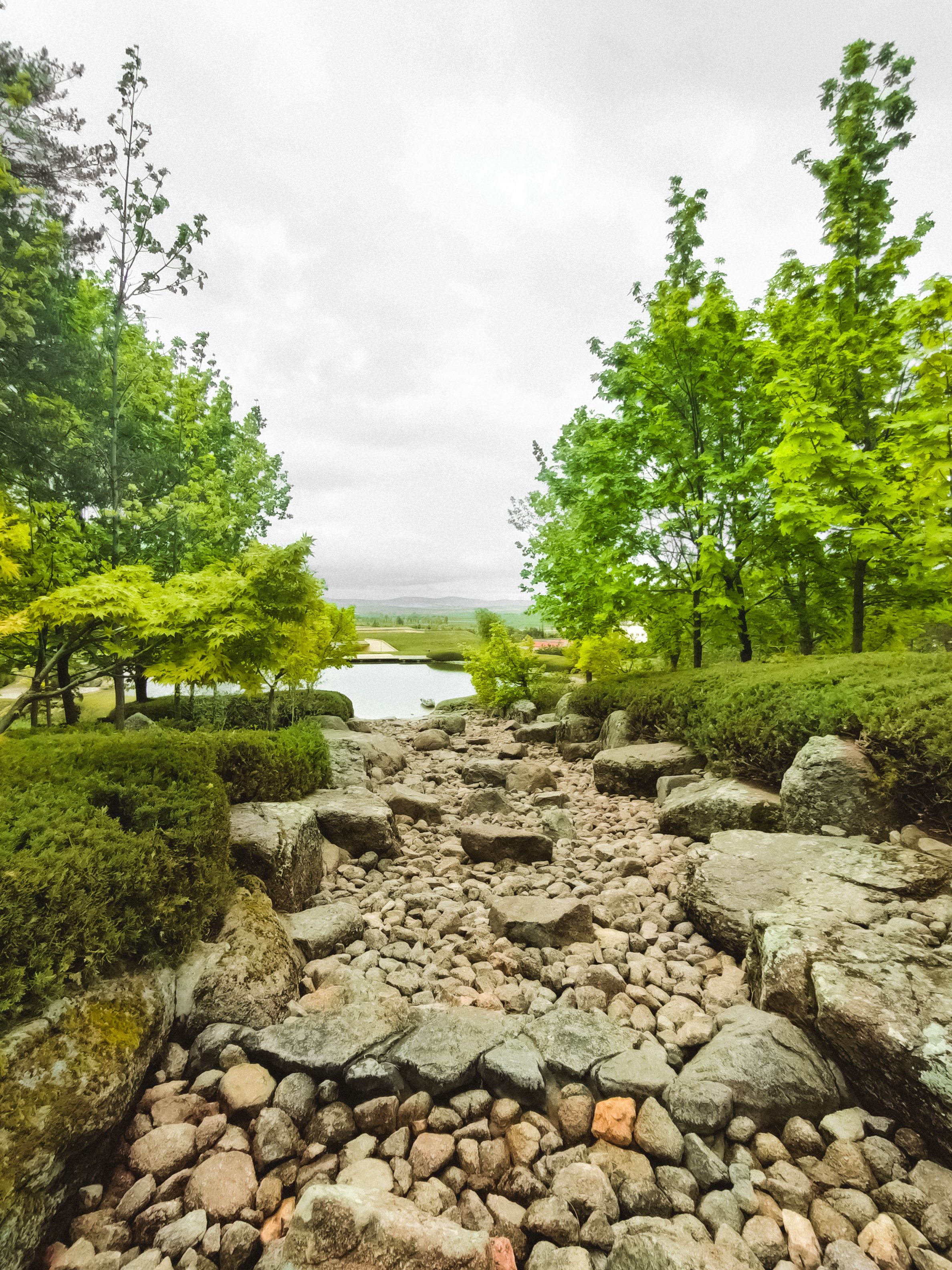 Stone Lined Empty Canal Leading to the Pond · Free Stock Photo