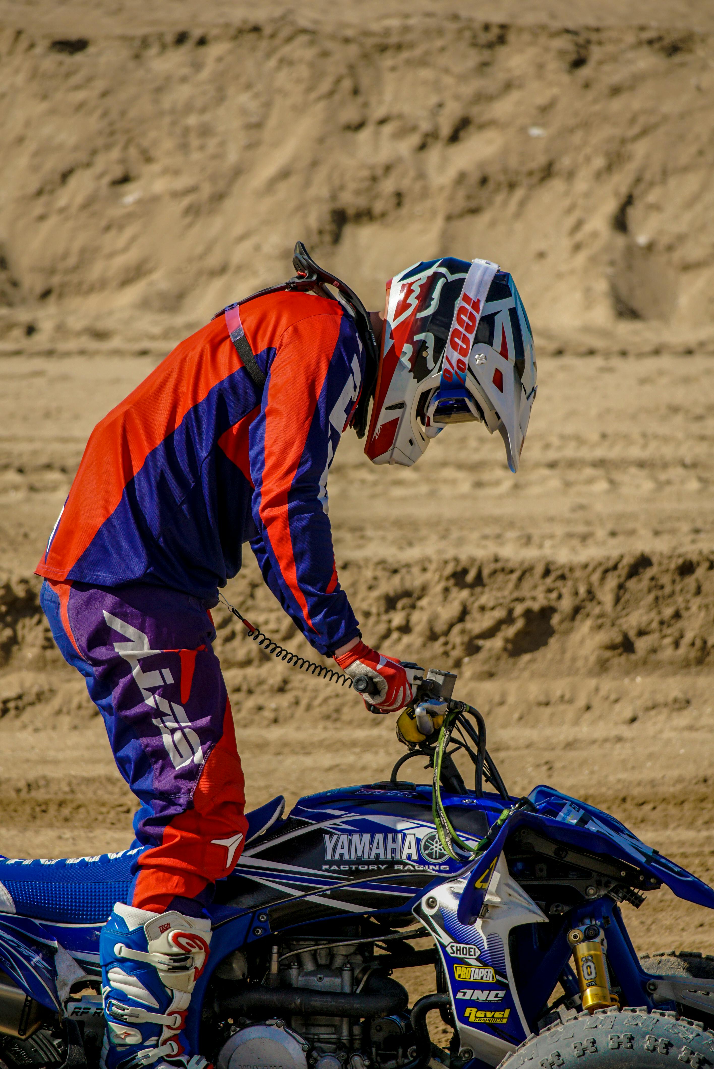 A Man on a Quad Bike on the Beach · Free Stock Photo