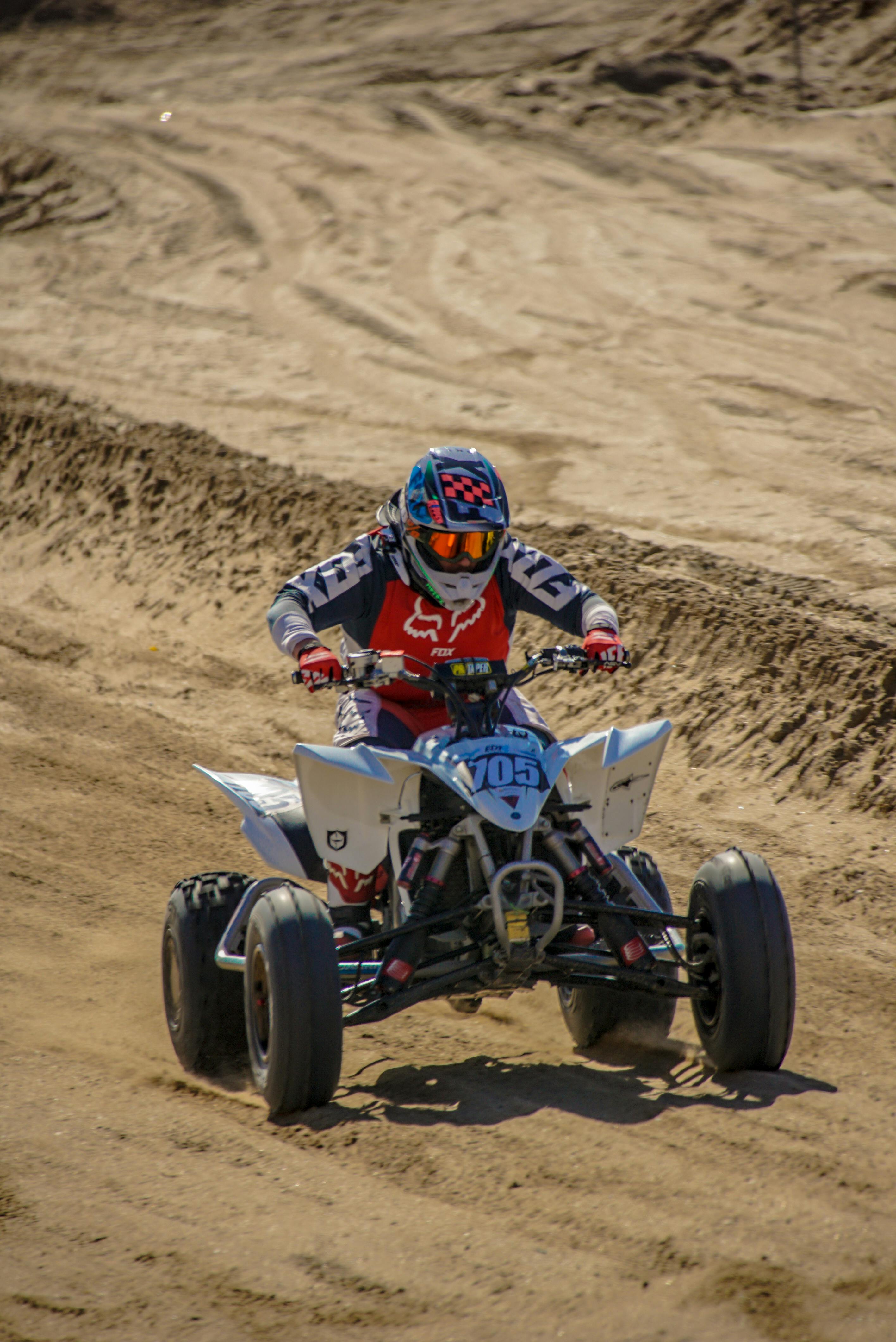 A Person Riding on a Quad Bike · Free Stock Photo