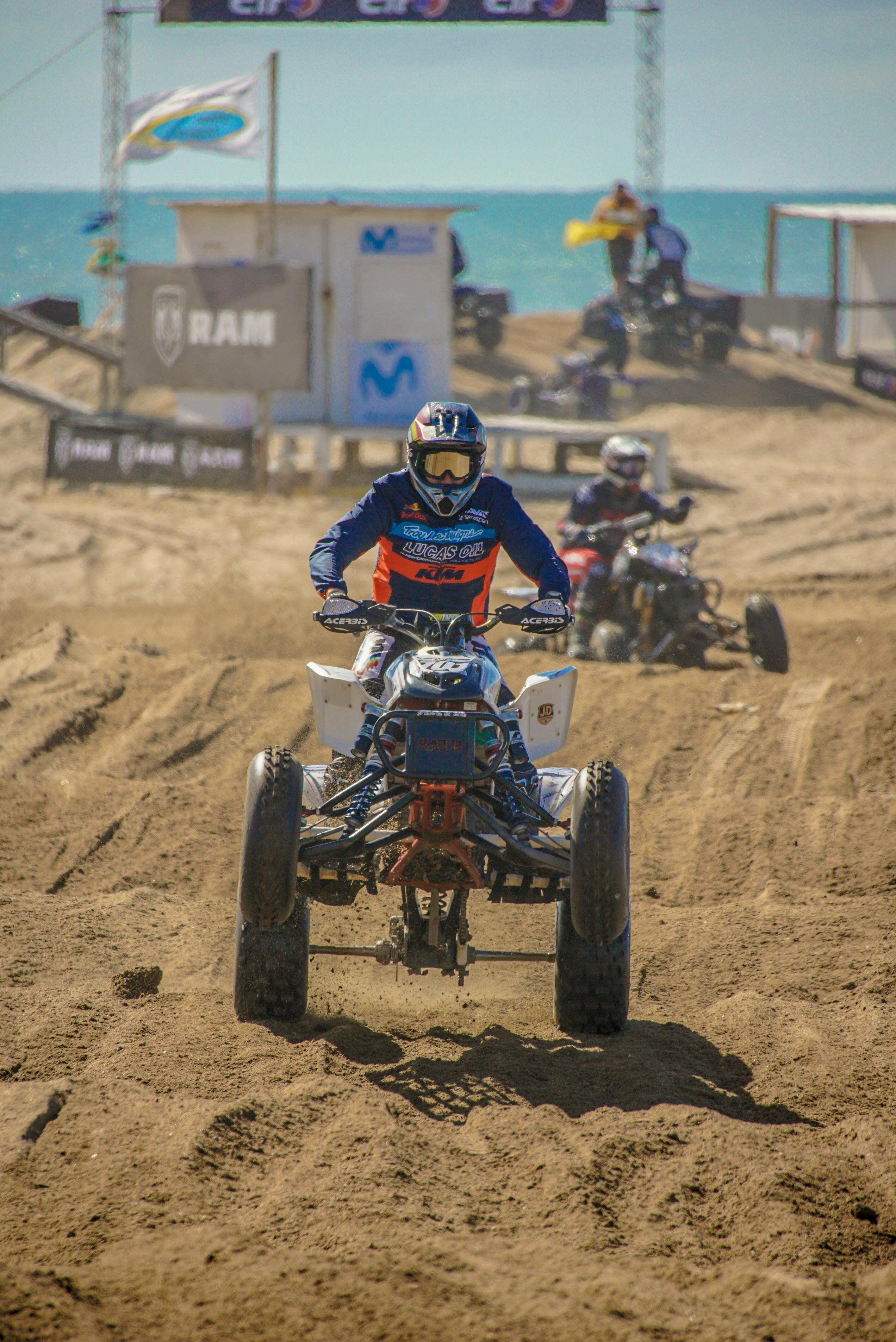 People Riding on Quad Bikes in the Desert · Free Stock Photo