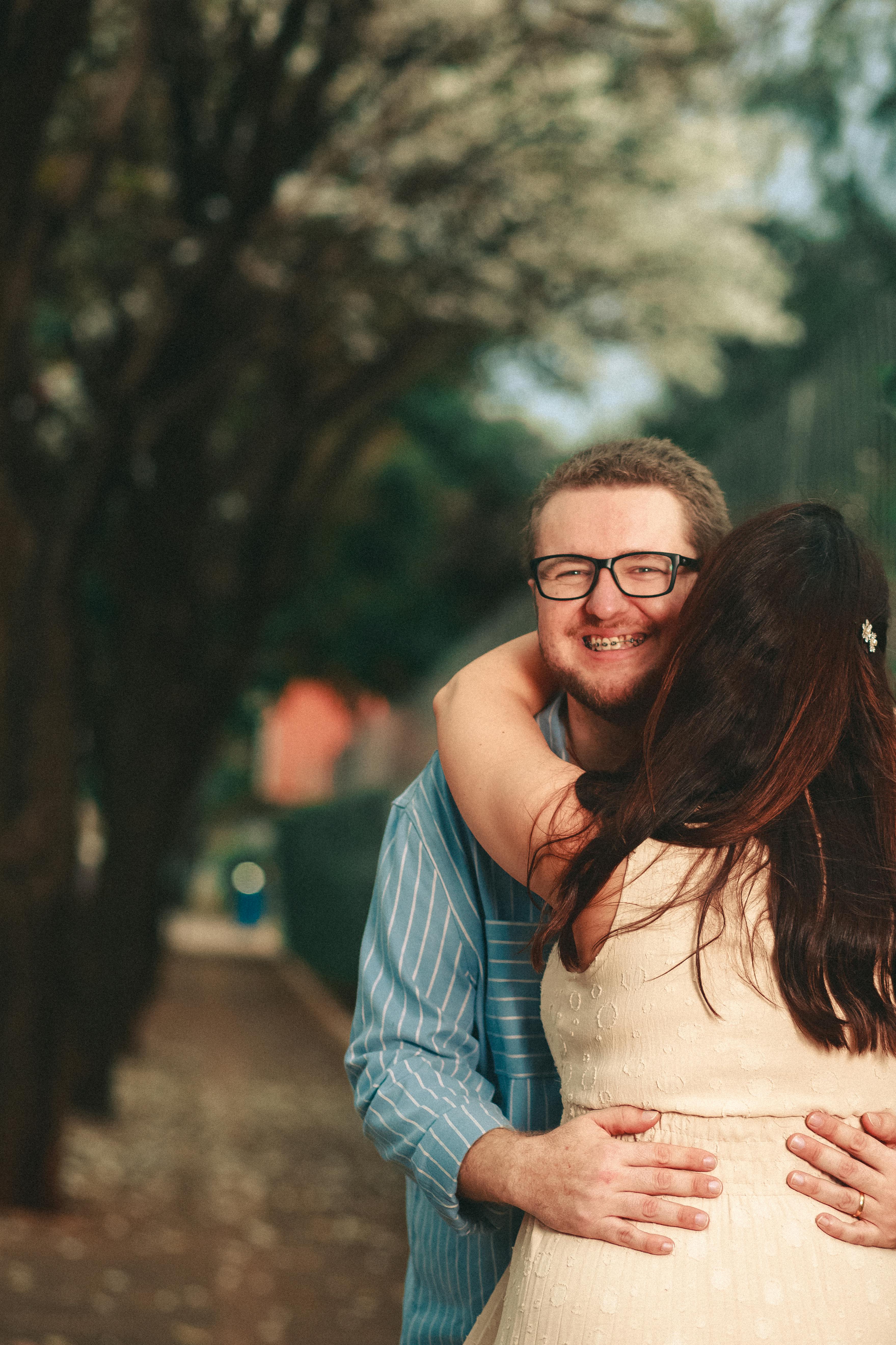 Man Picking Up a Woman and Smiling · Free Stock Photo