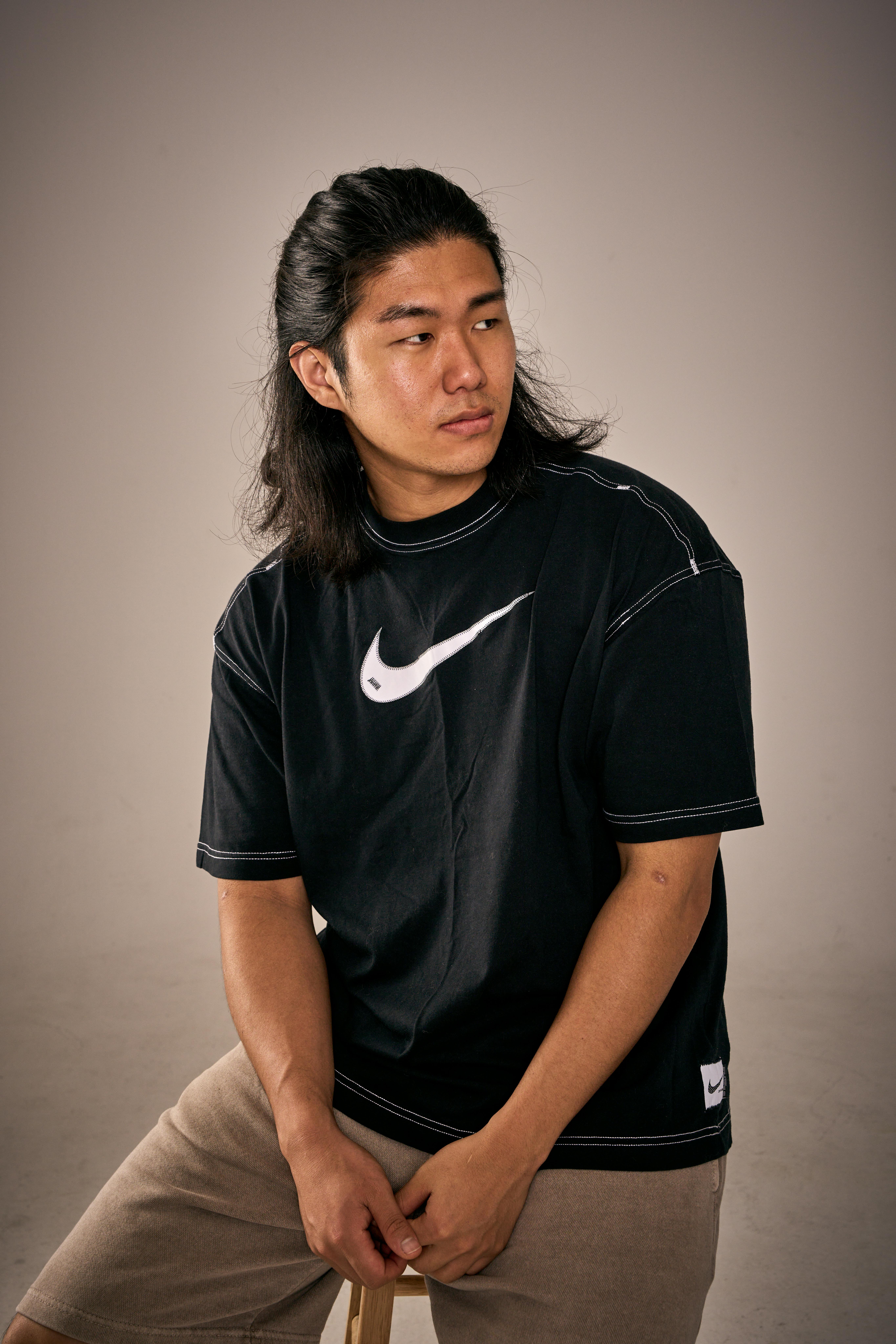 Handsome Man in Black Nike T-Shirt · Free Stock Photo