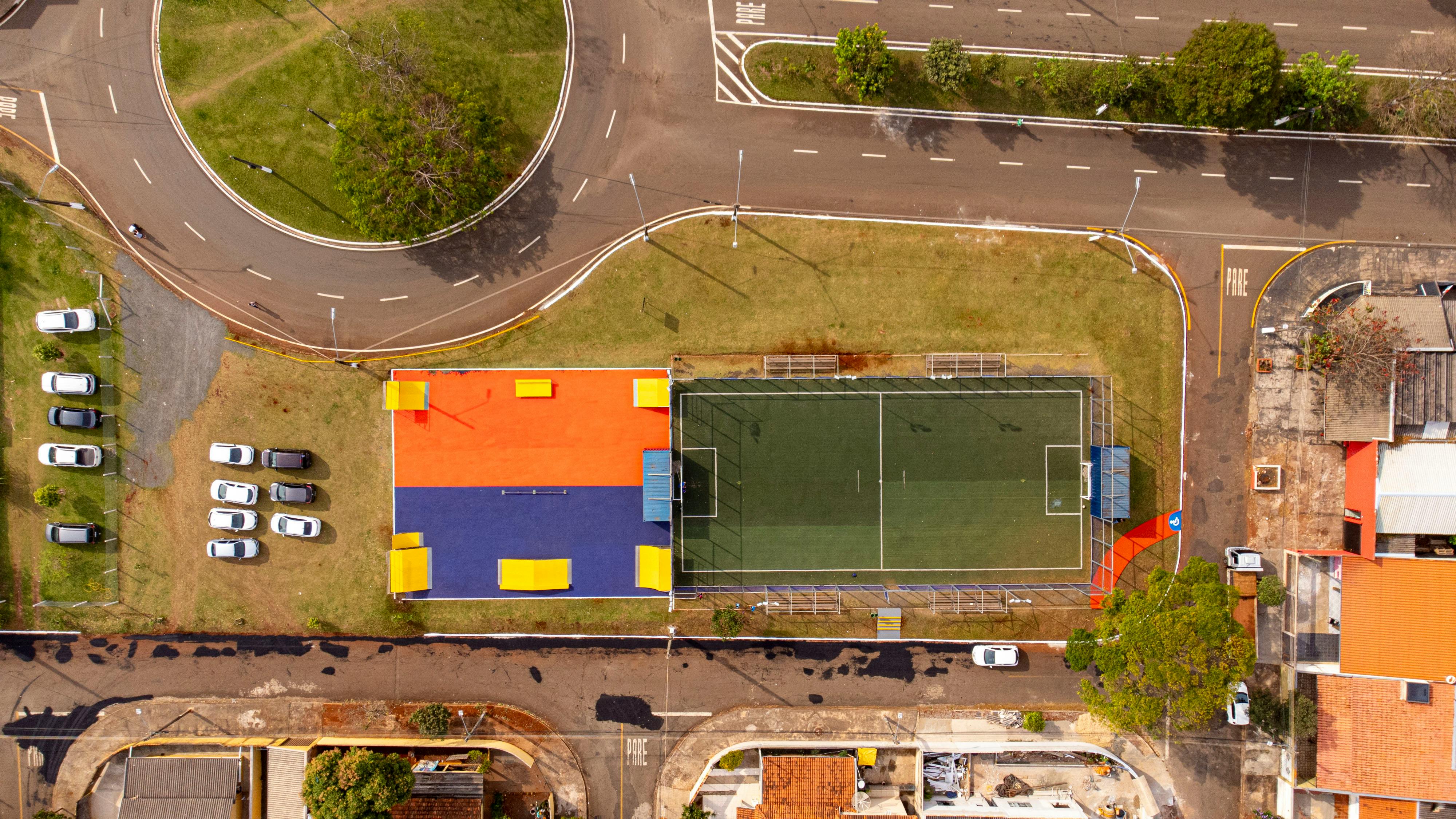 Soccer Field by Roundabout in City · Free Stock Photo
