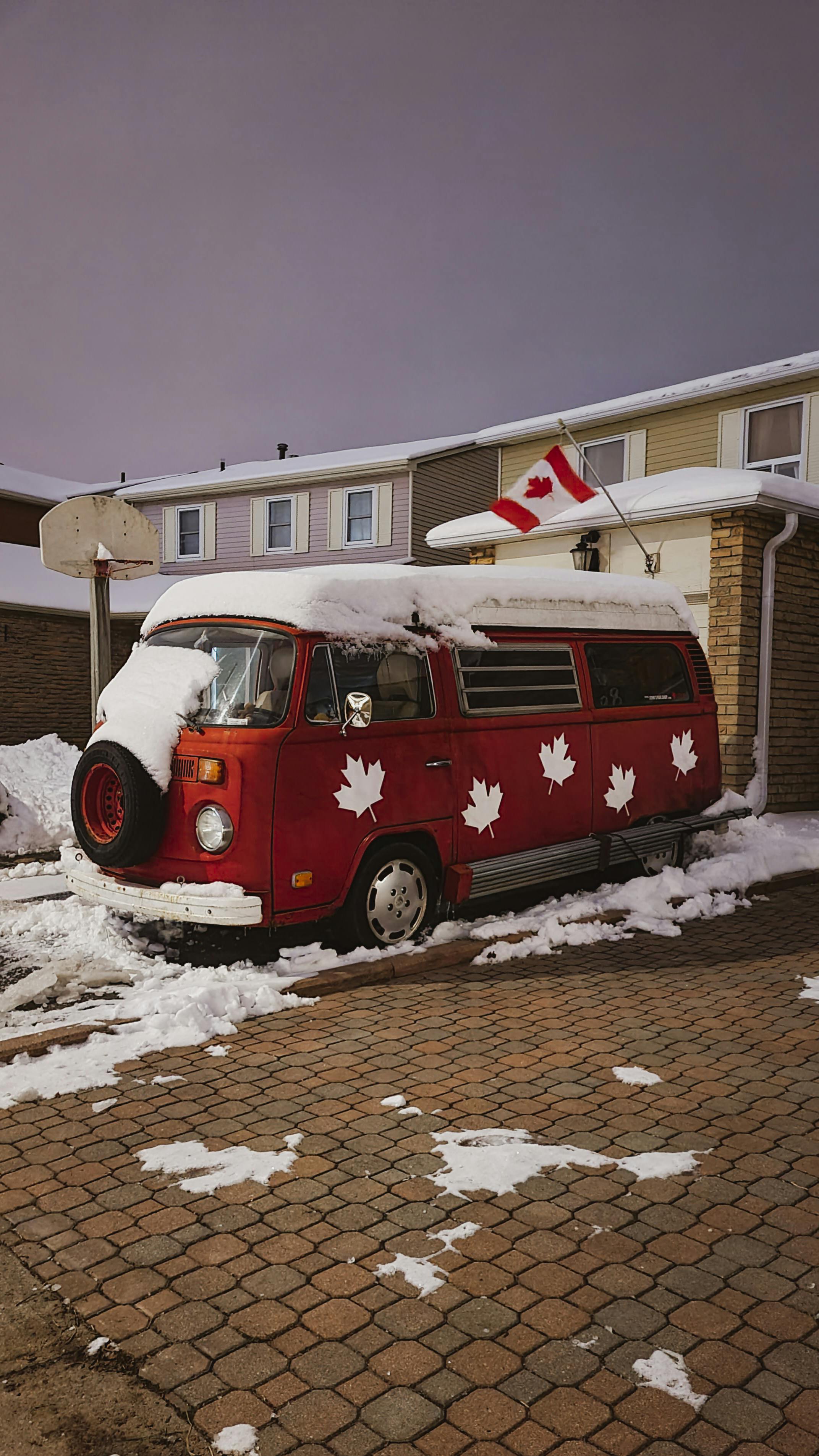 A Red Camper on a Driveway · Free Stock Photo
