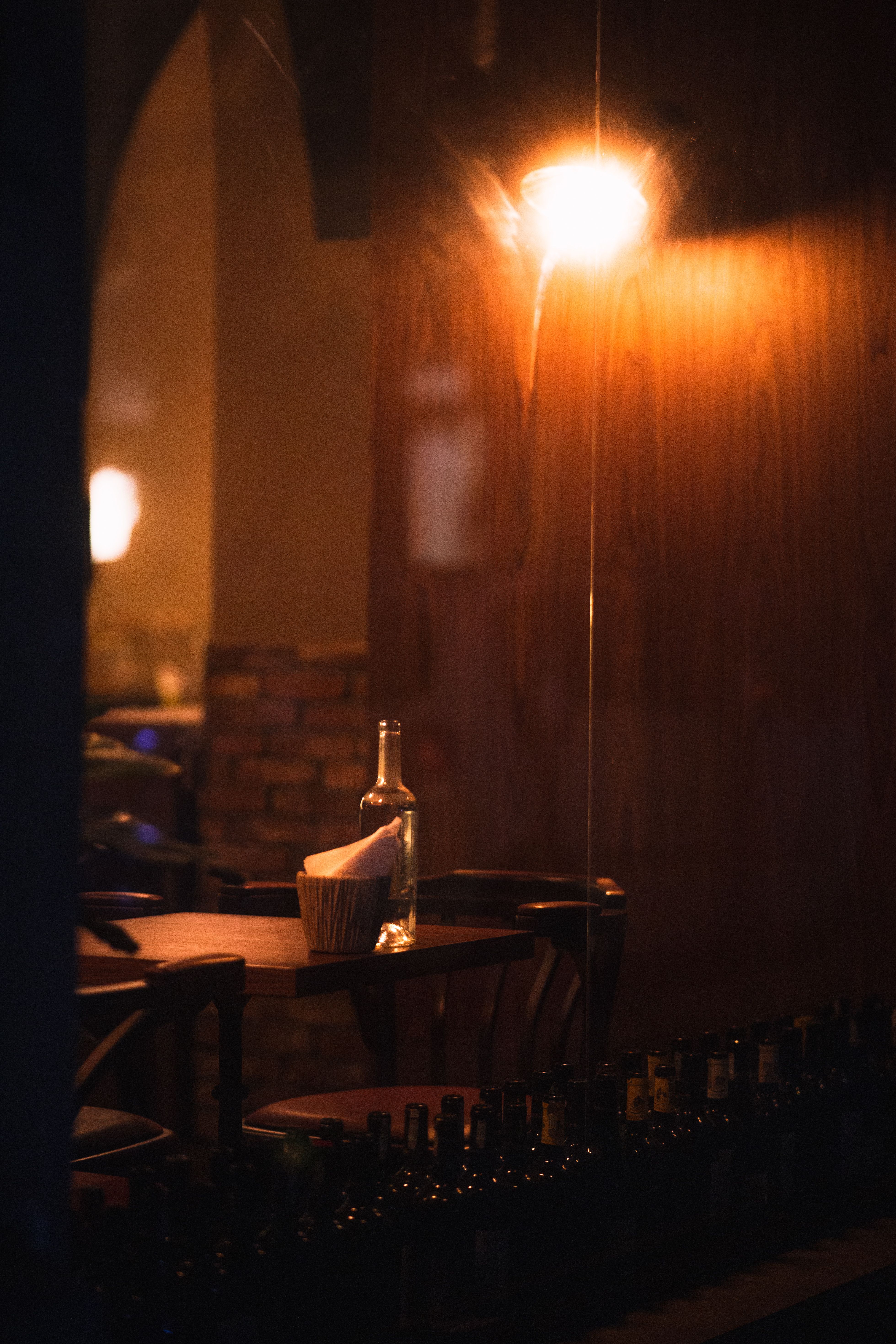 View of an Empty Bar Table in Dim Light · Free Stock Photo