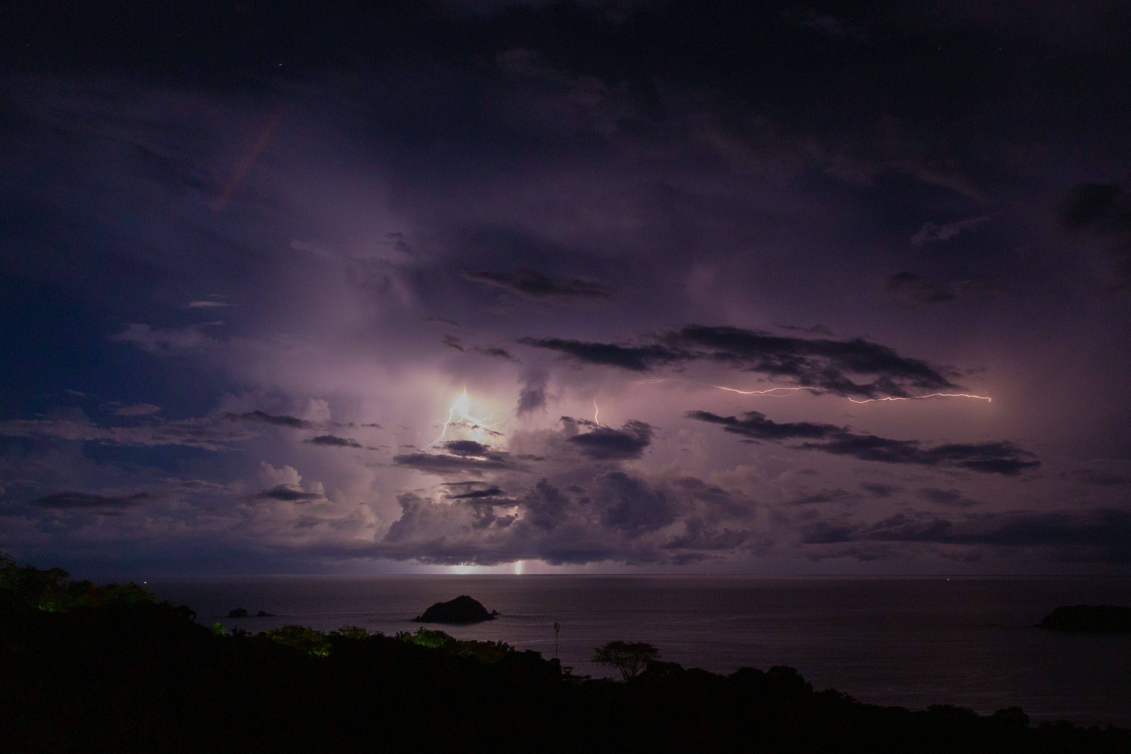 Purple Night Sky with Thunderstorm · Free Stock Photo