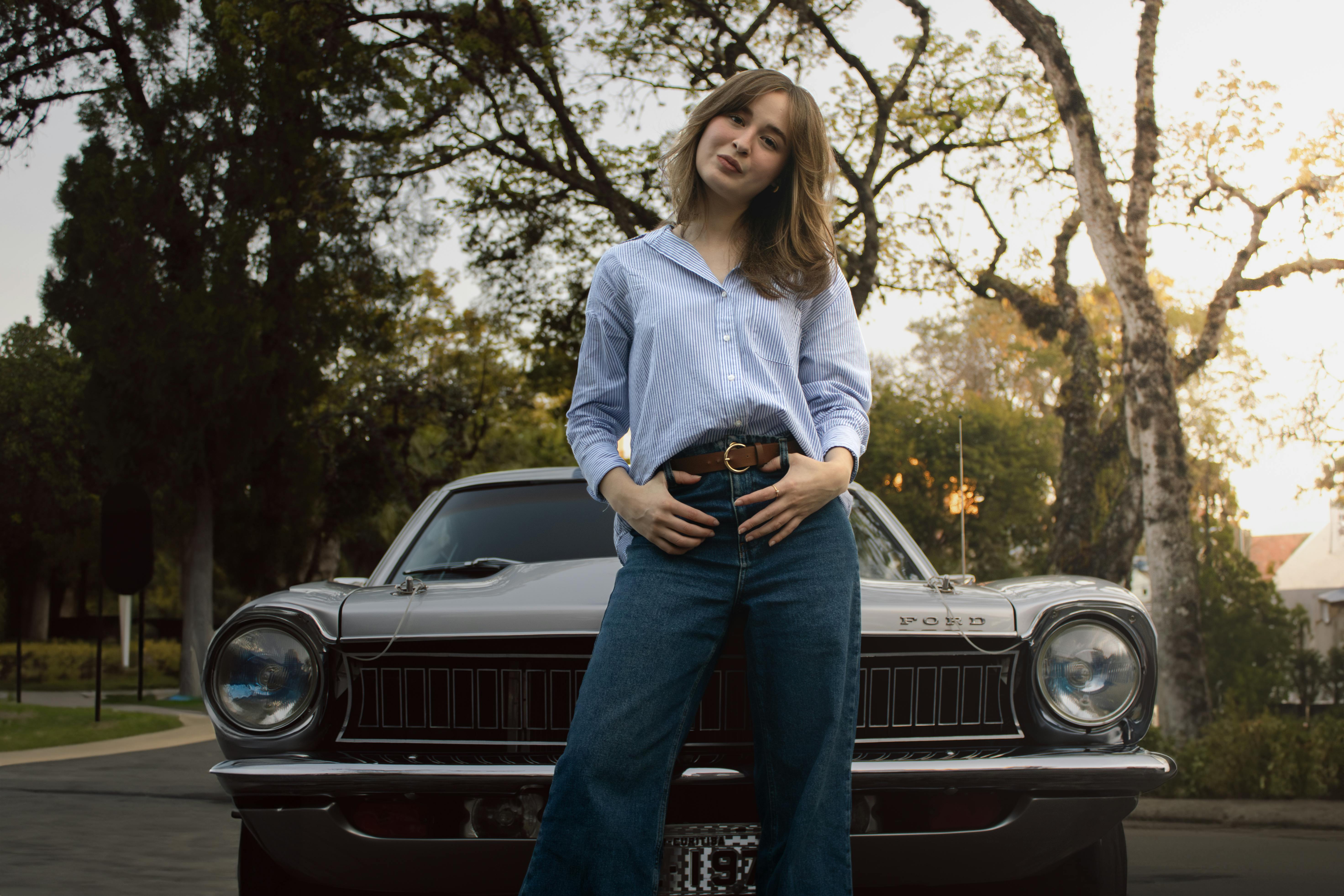 Woman in Shirt Standing by Vintage Ford · Free Stock Photo