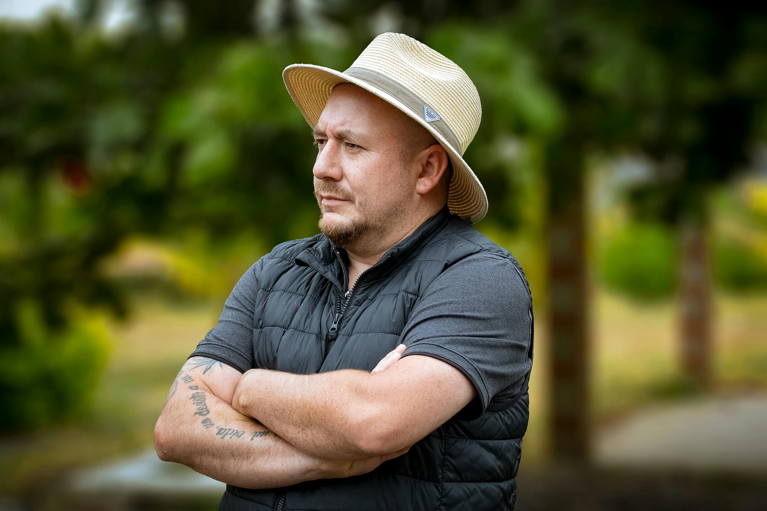 Portrait of Man Wearing Straw Hat · Free Stock Photo