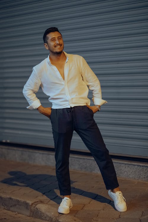 Smiling Well-dressed Man Standing on Sidewalk · Free Stock Photo Smiling Well-dressed Man Standing on Sidewalk · Free Stock Photo