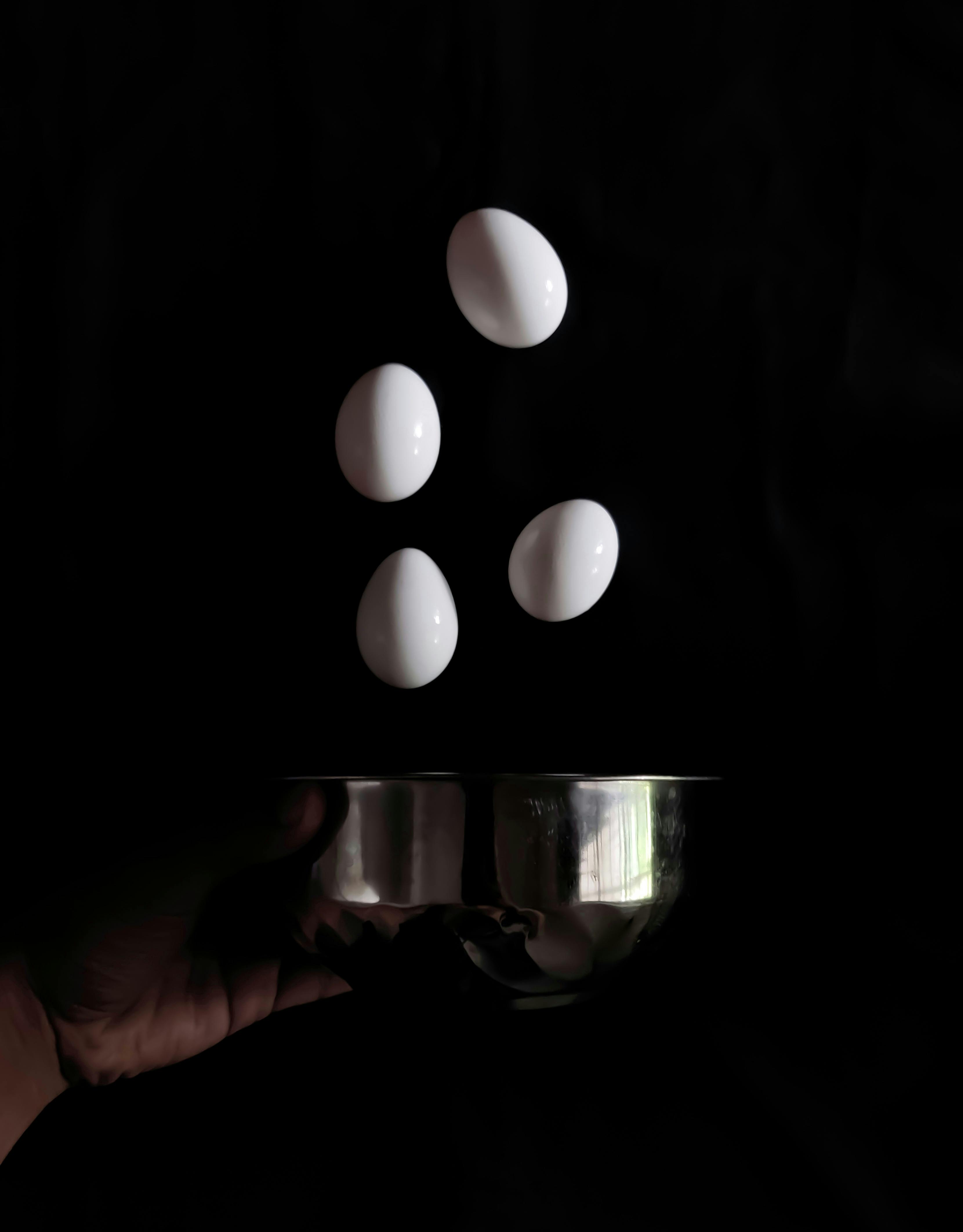 Eggs Falling into a Bowl · Free Stock Photo