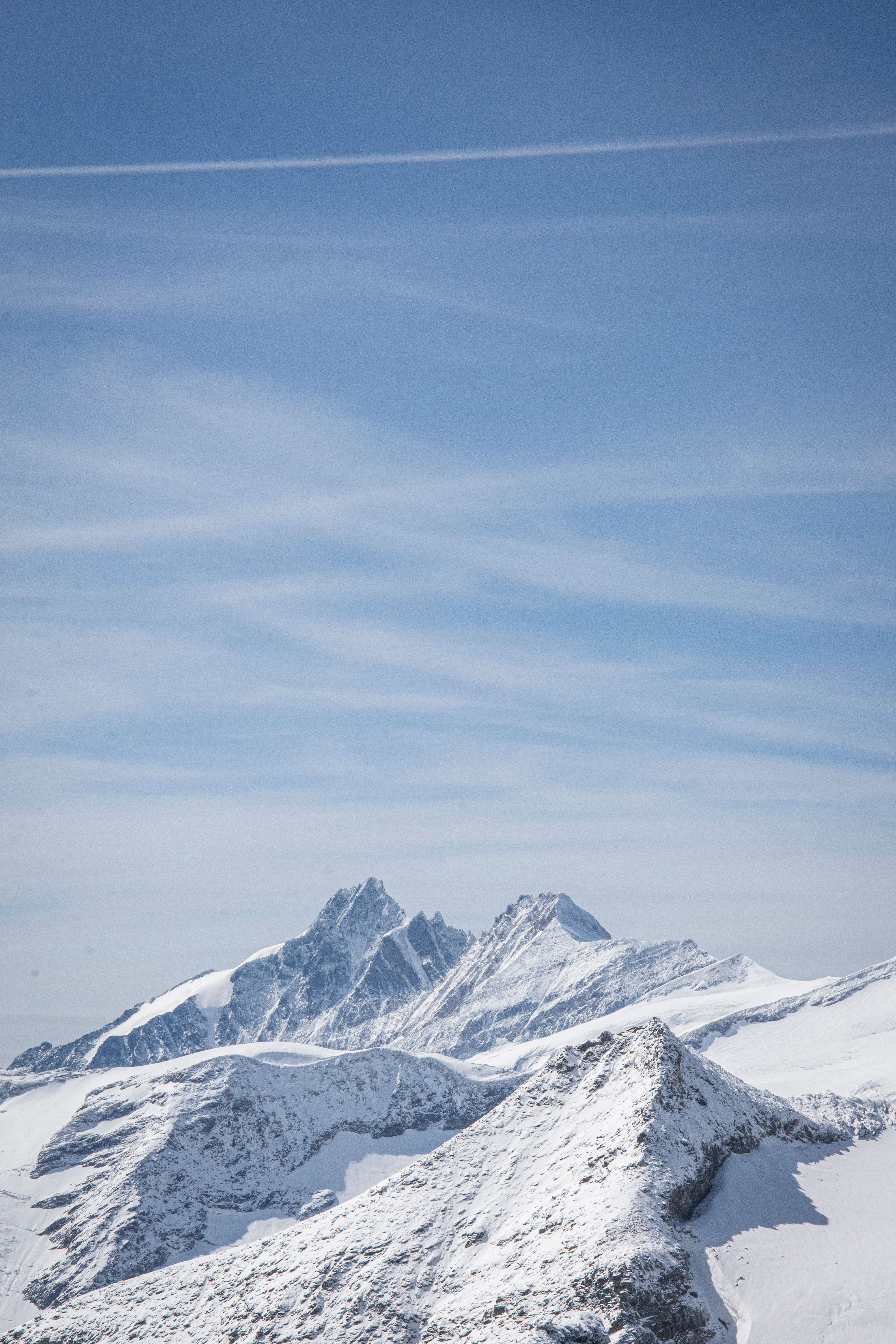 Sky over Snowcapped Peaks · Free Stock Photo