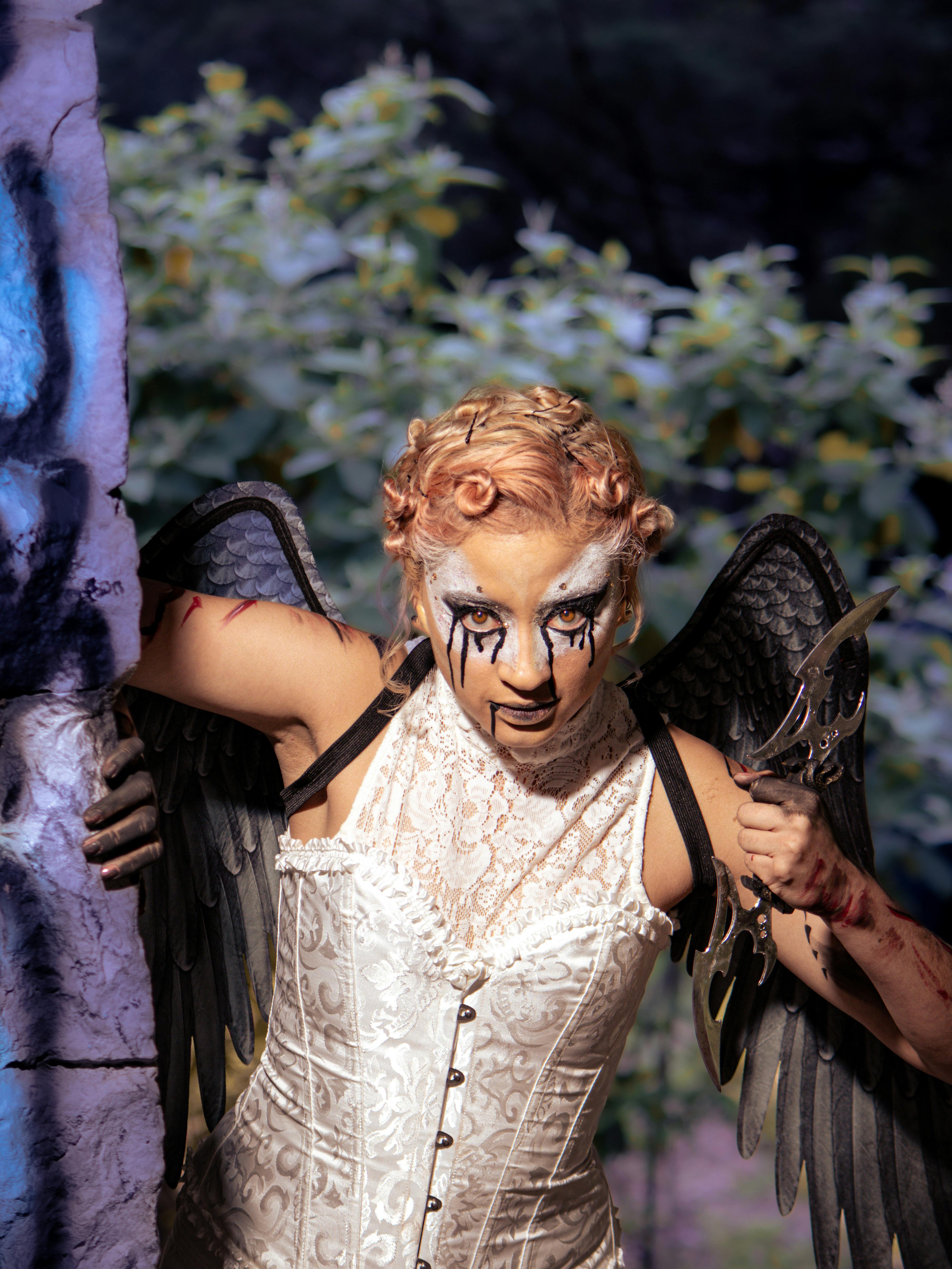 Photo of a Blonde Wearing a Theatrical Angel Costume · Free Stock Photo