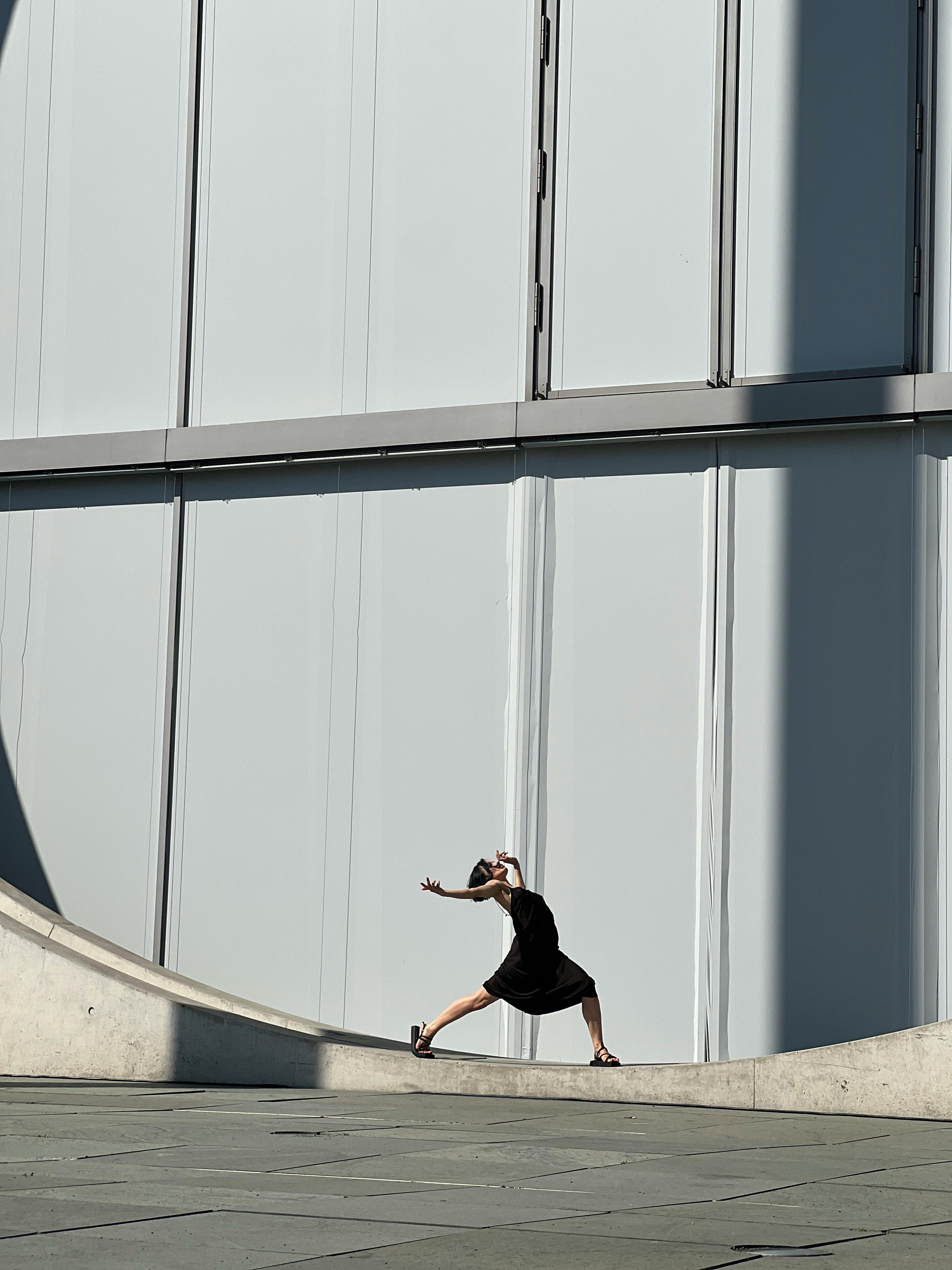 Dancer by Modern Building · Free Stock Photo
