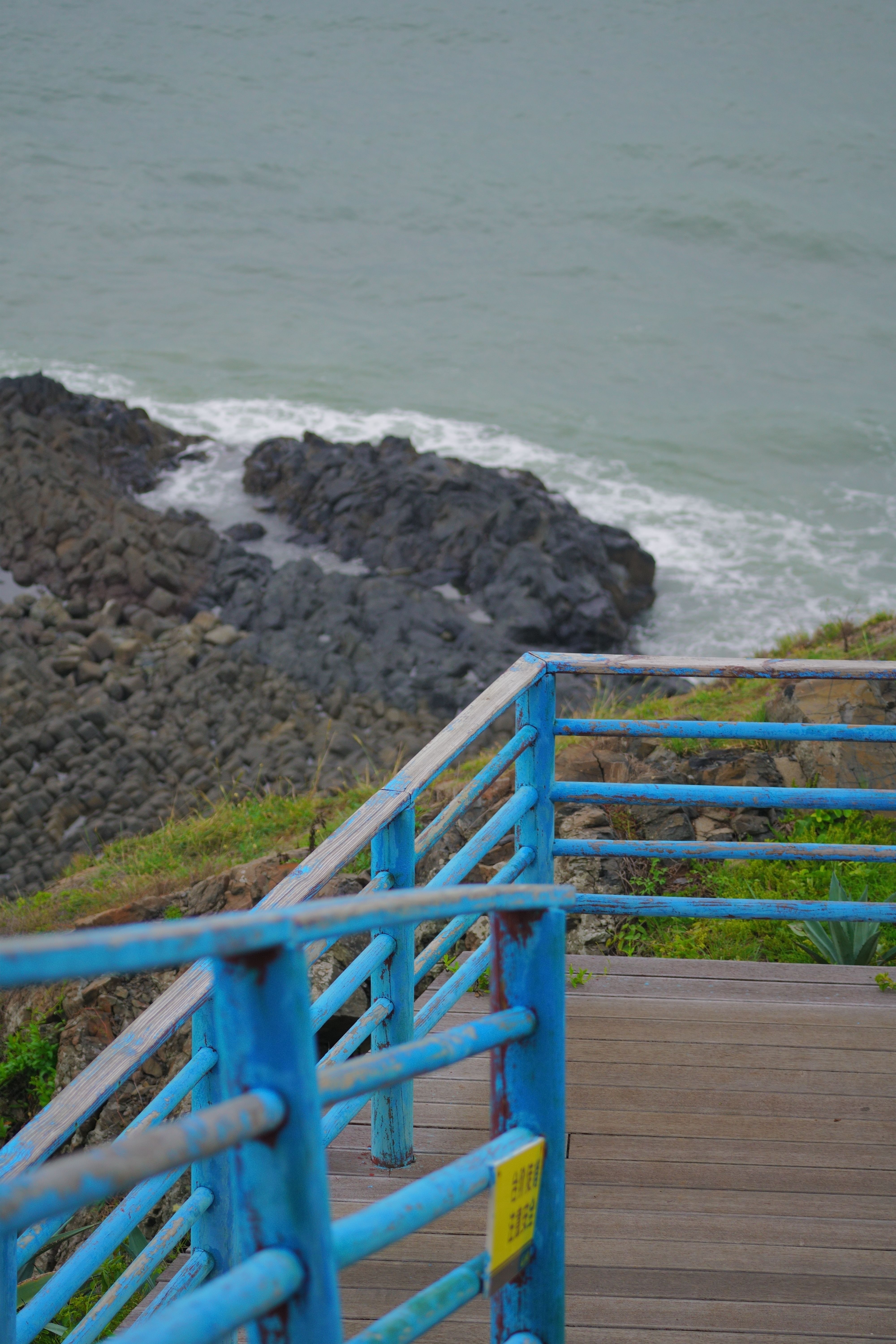 Foamy Sea Surface Through the Ferry Railing · Free Stock Photo
