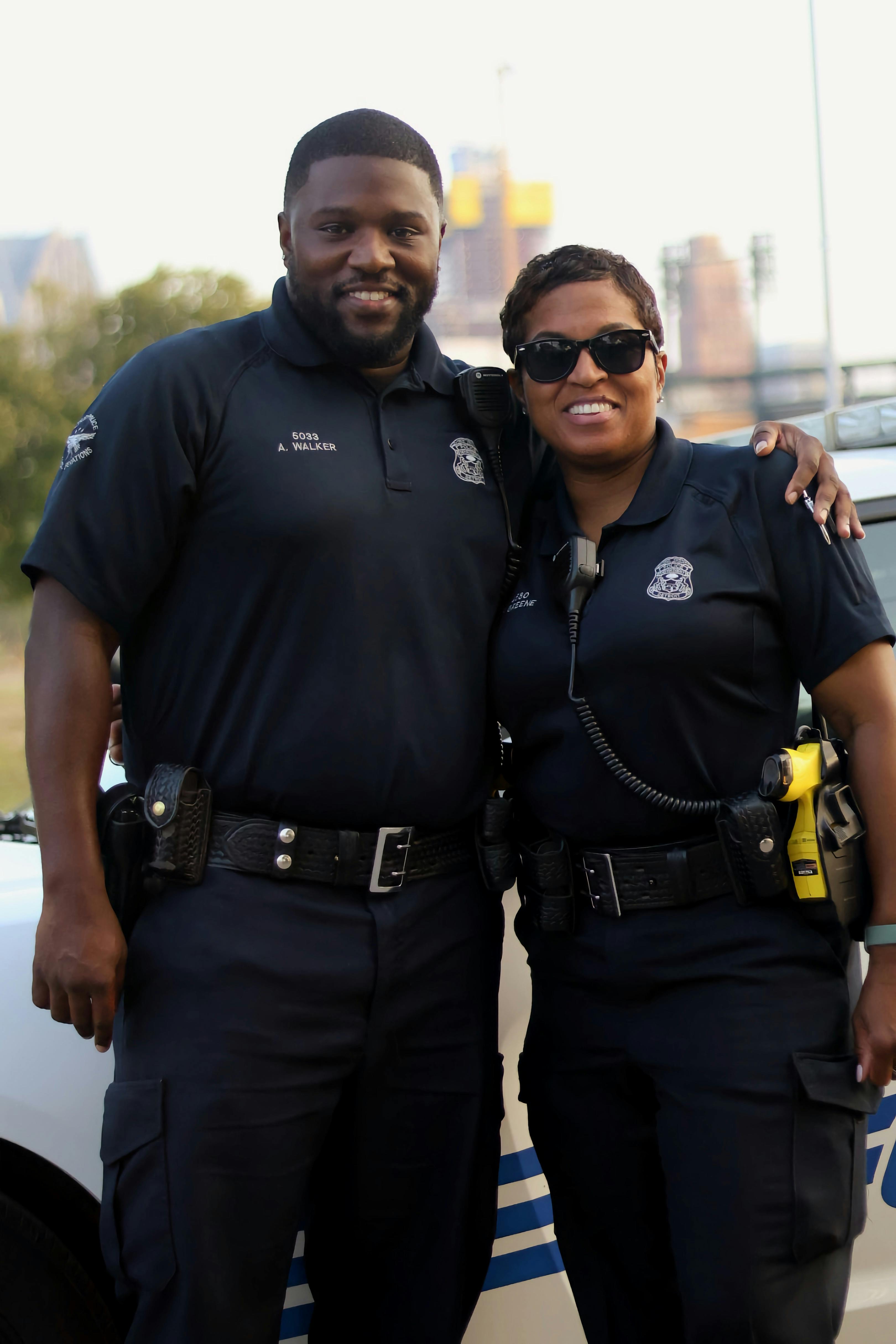 Portrait of Smiling Police Officers · Free Stock Photo