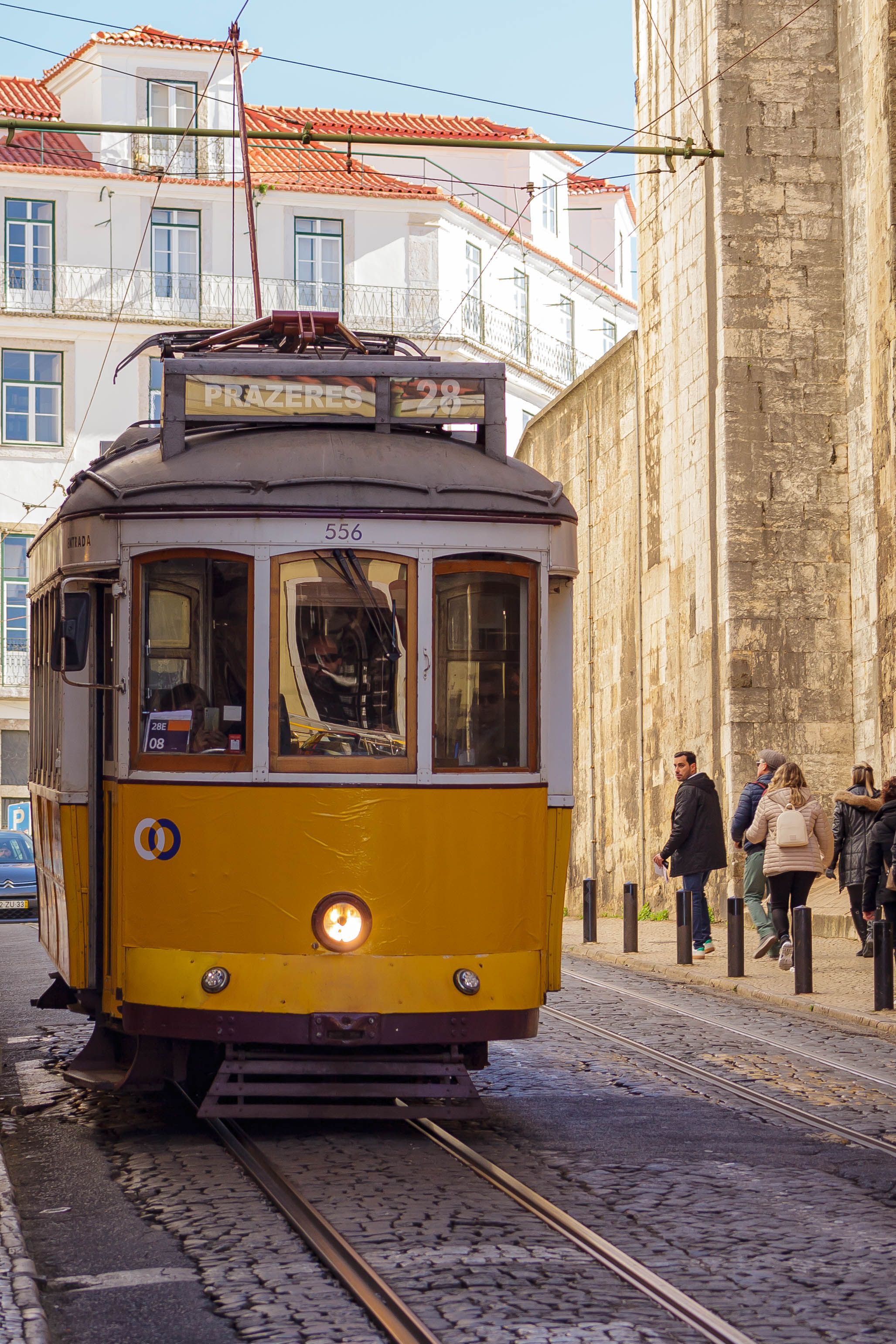 Old Tram on Paved City Street · Free Stock Photo
