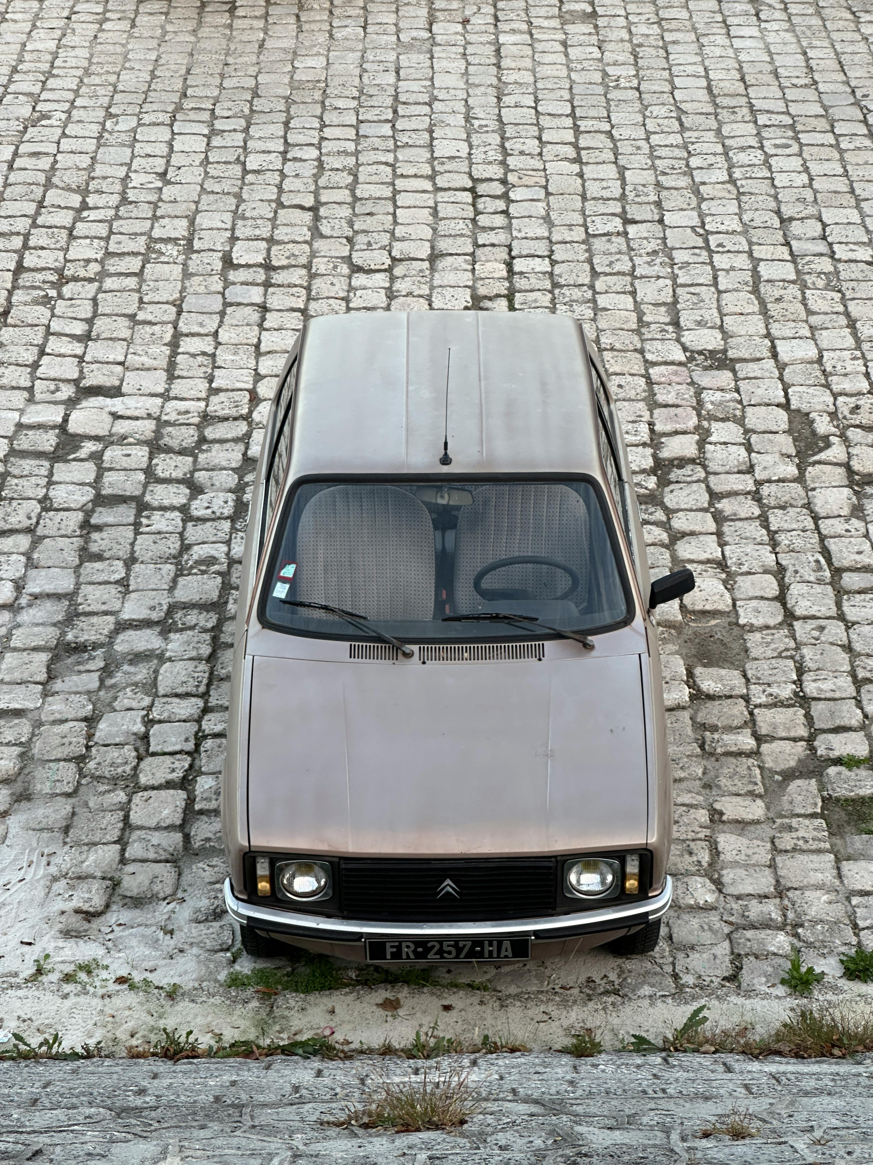 Car Parked on Pavement · Free Stock Photo