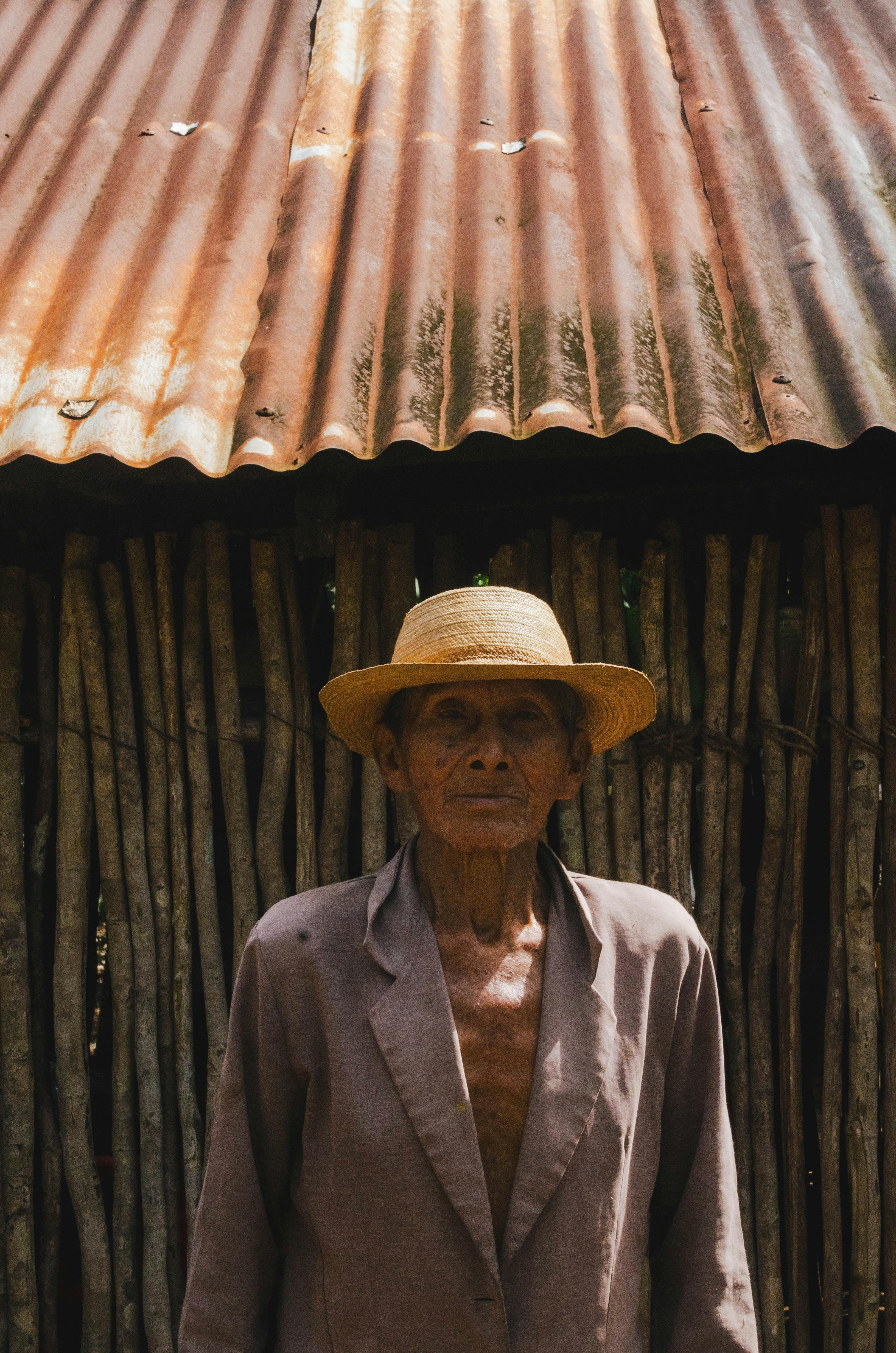 A Woman in a Coat Praying · Free Stock Photo