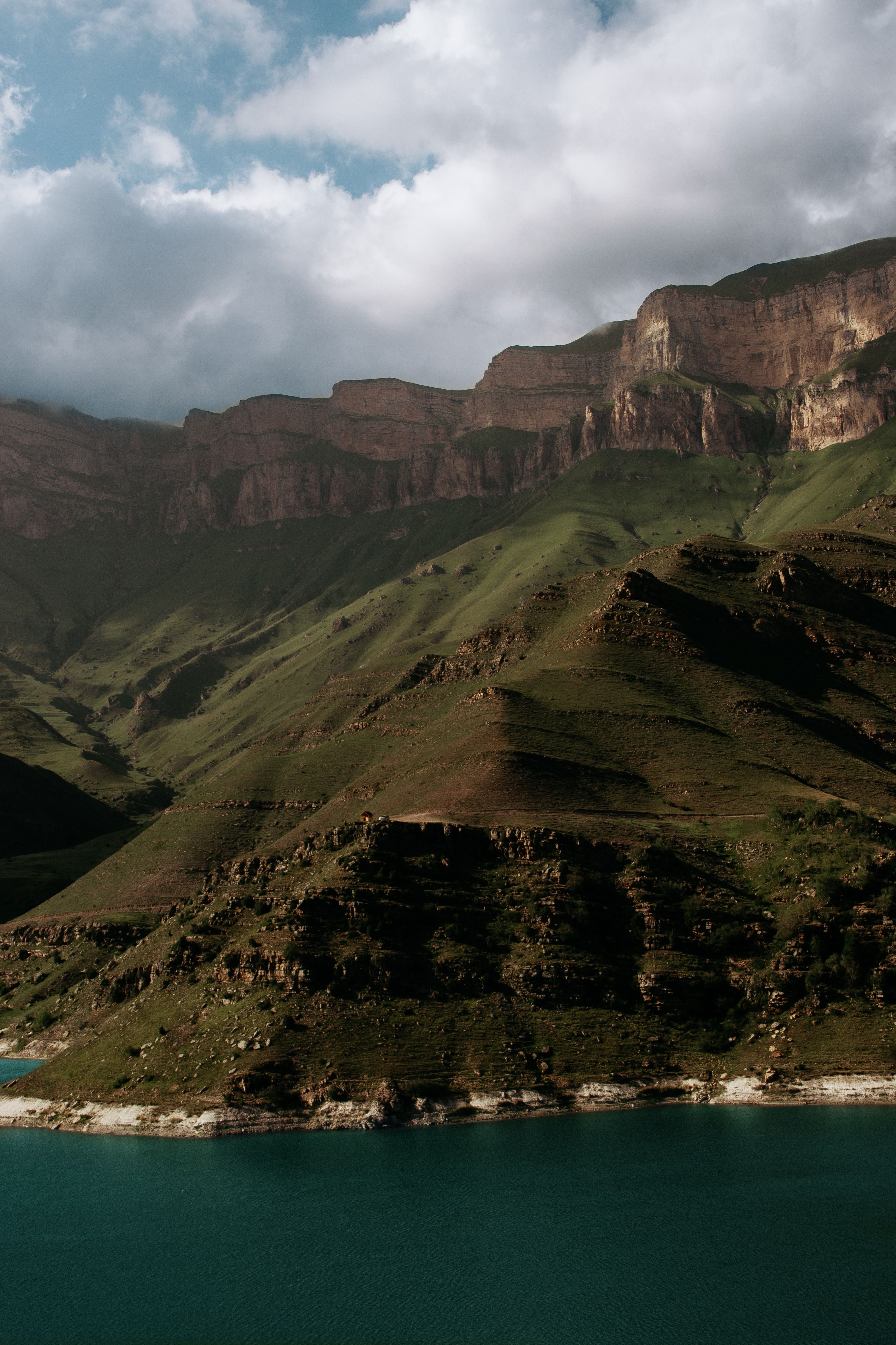 Green Mountain Slope on Shore · Free Stock Photo