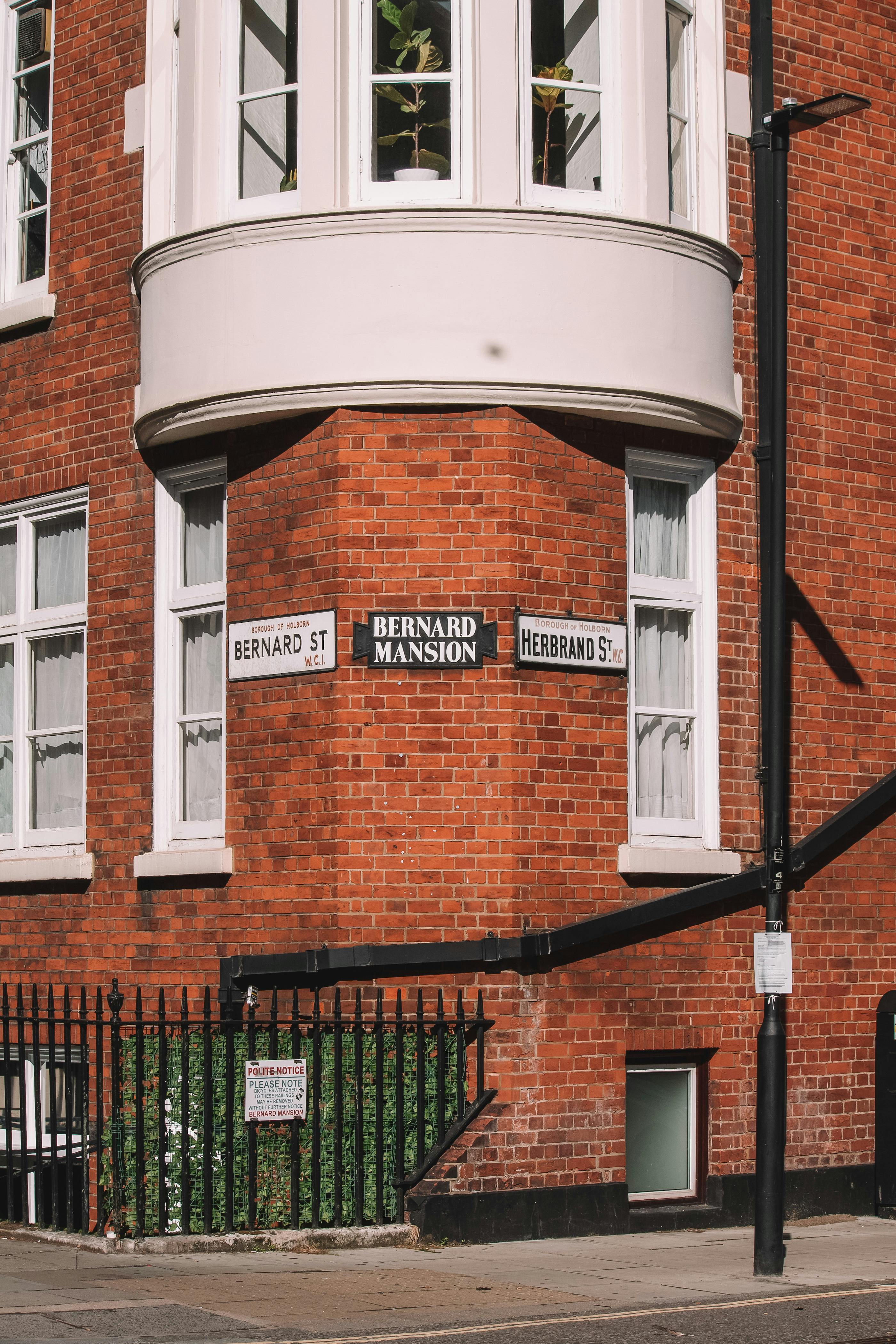 Bricks Wall of Building on Street Corner · Free Stock Photo