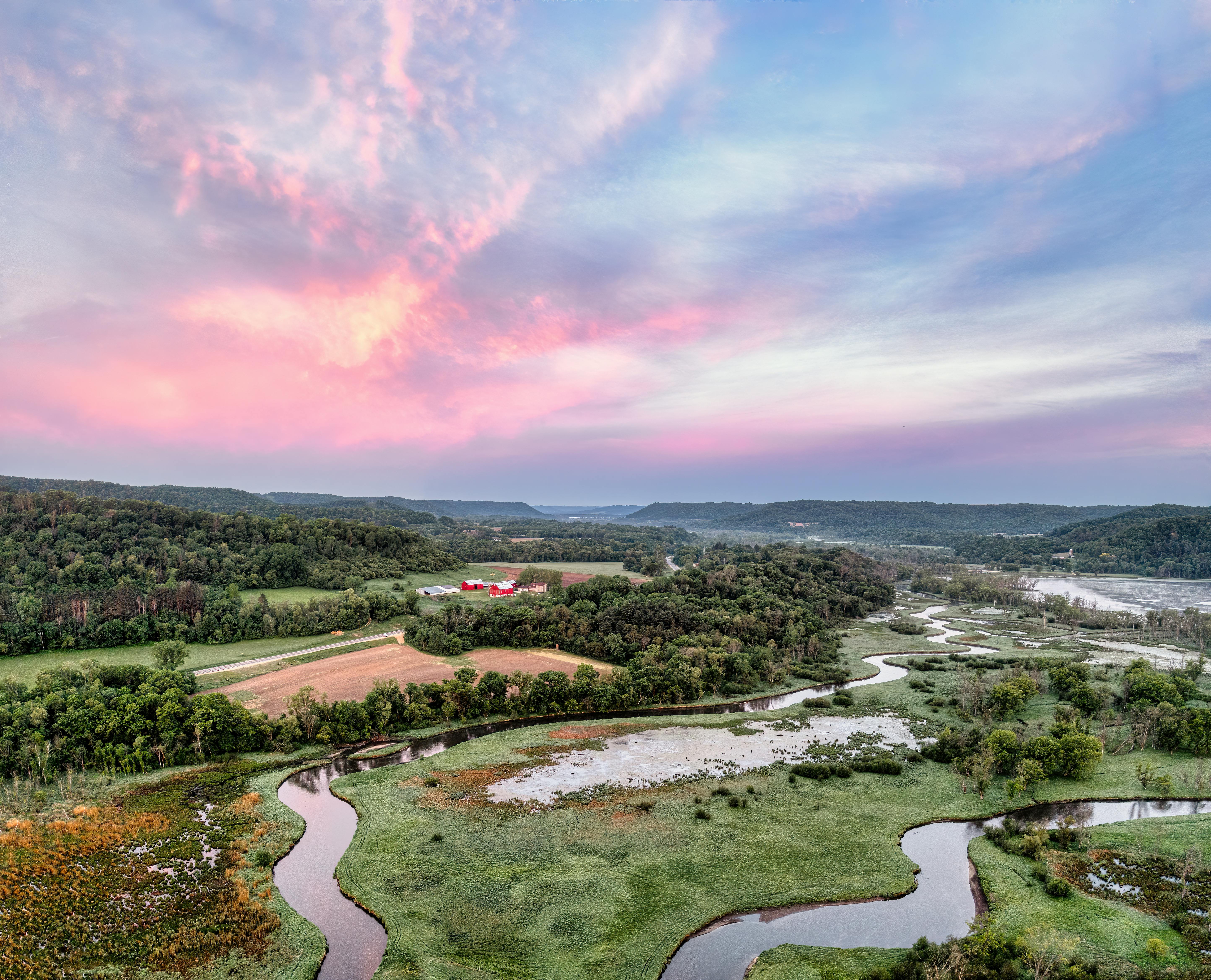 Sunset over Green Plains with River · Free Stock Photo