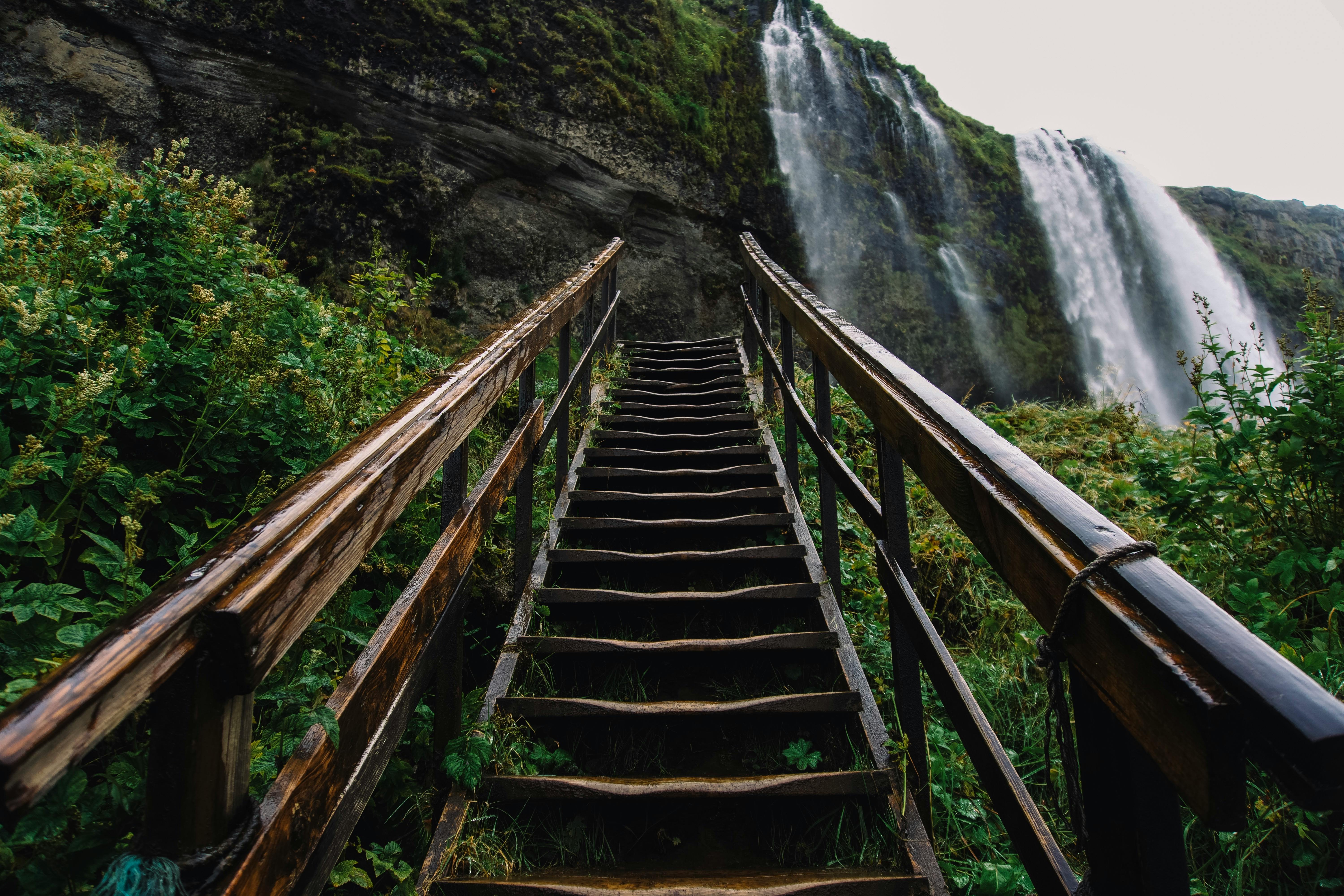 Wooden Stairs in the Mountains with a View of a Waterfall · Free Stock Photo