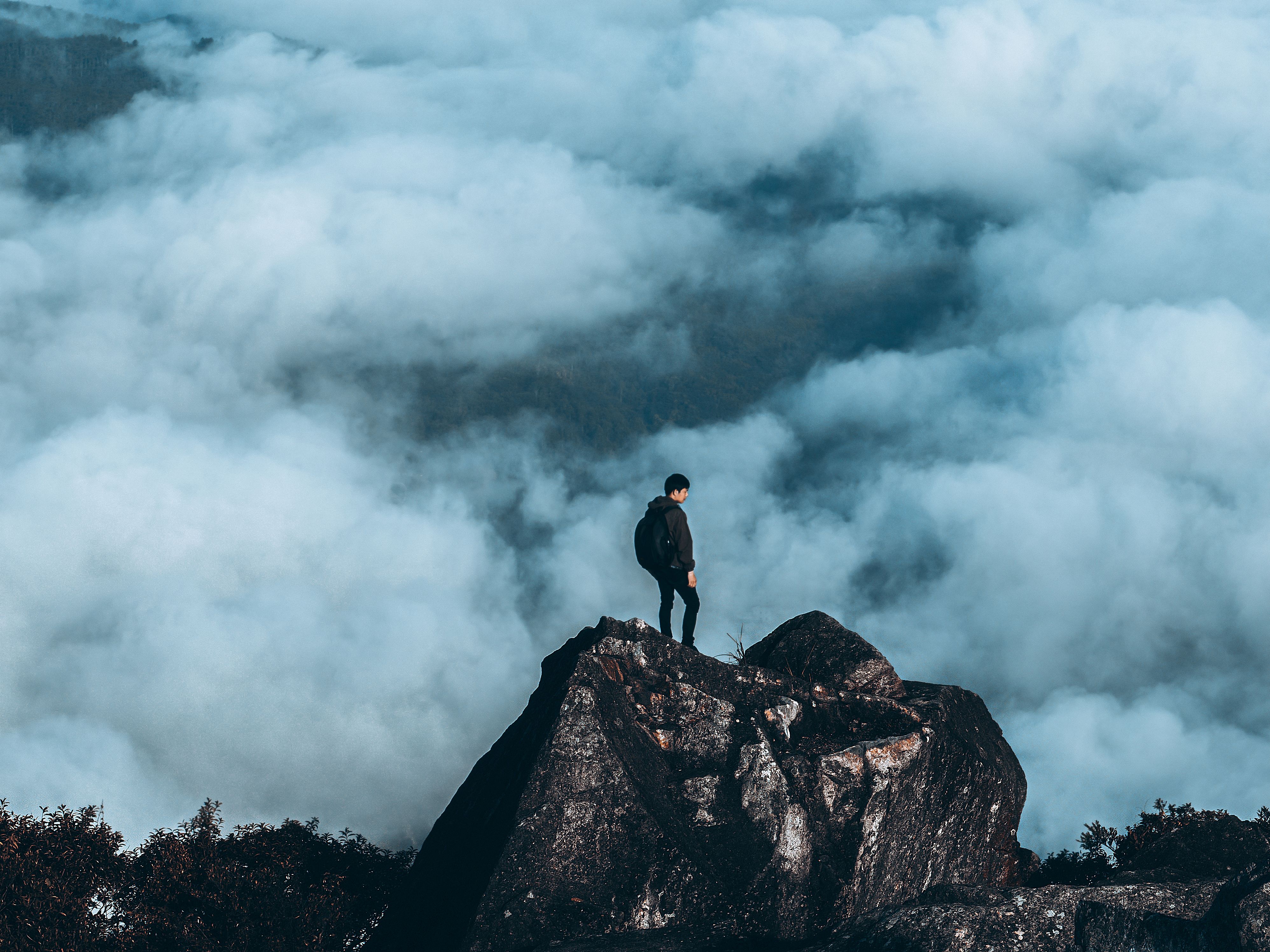 Man Looking At A Rock Formation · Free Stock Photo