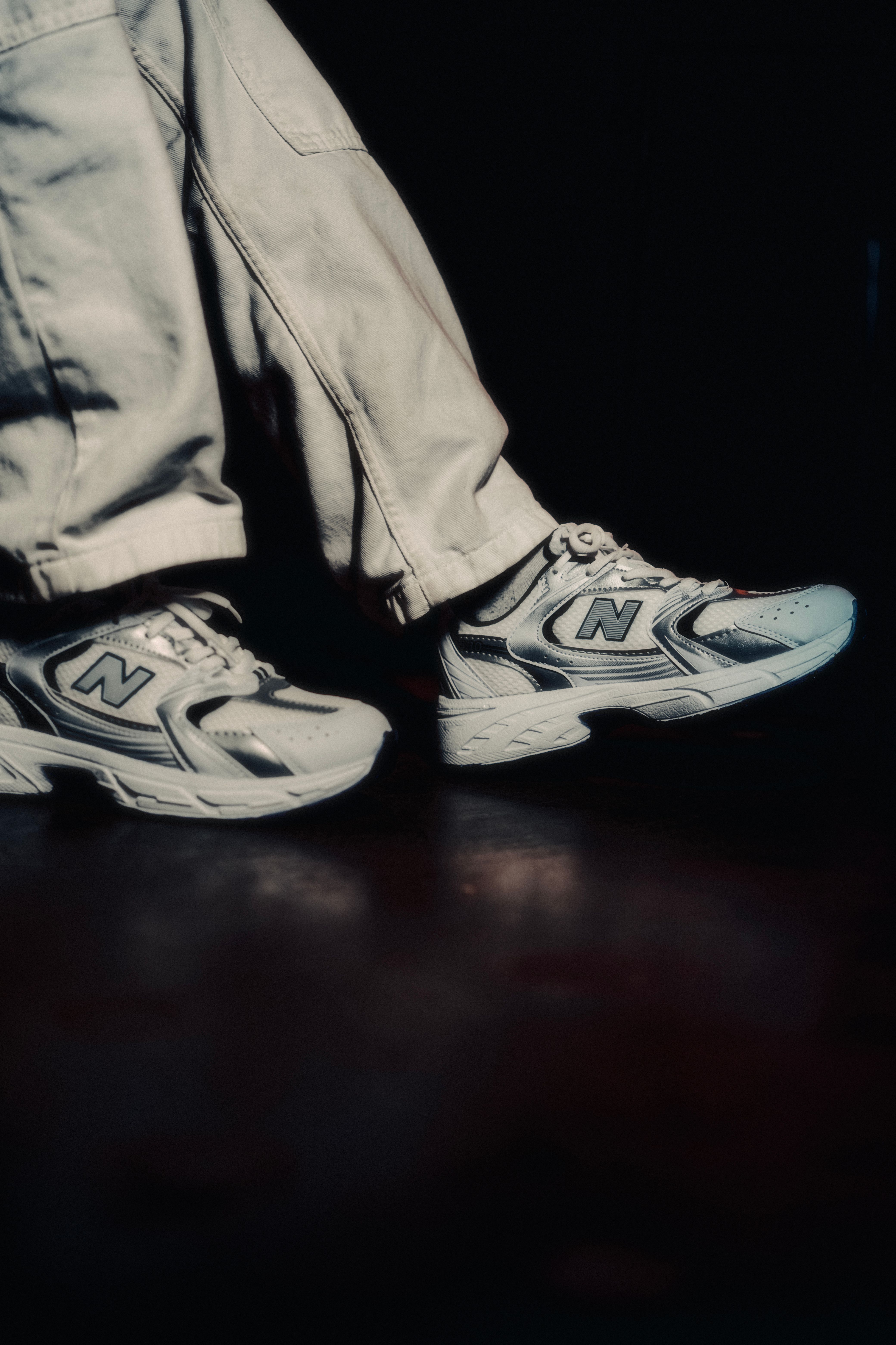Nike Dunk High Retro Shoes with Black Nike Socks on Legs · Free Stock Photo