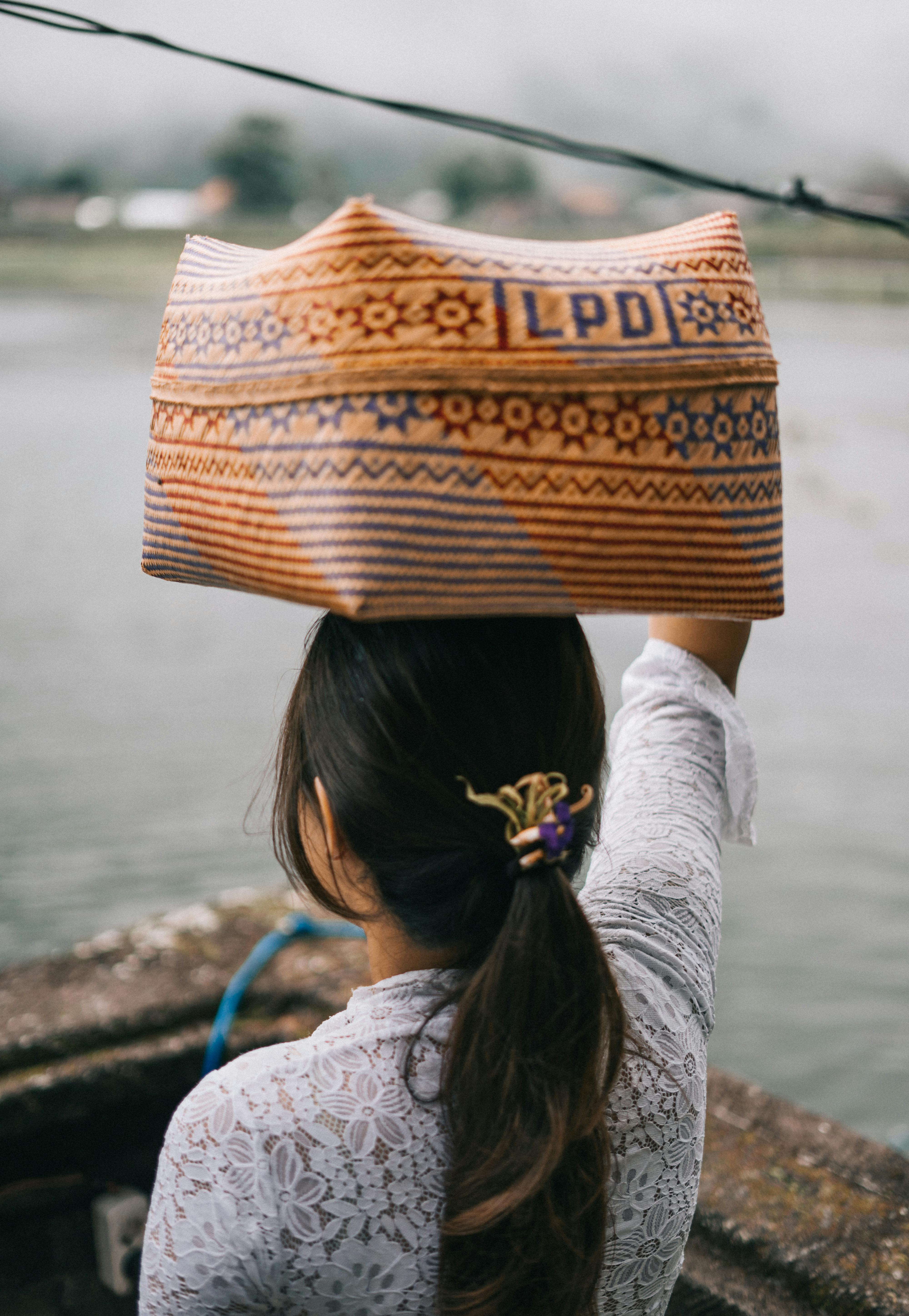 Woman With Basket On Head · Free Stock Photo
