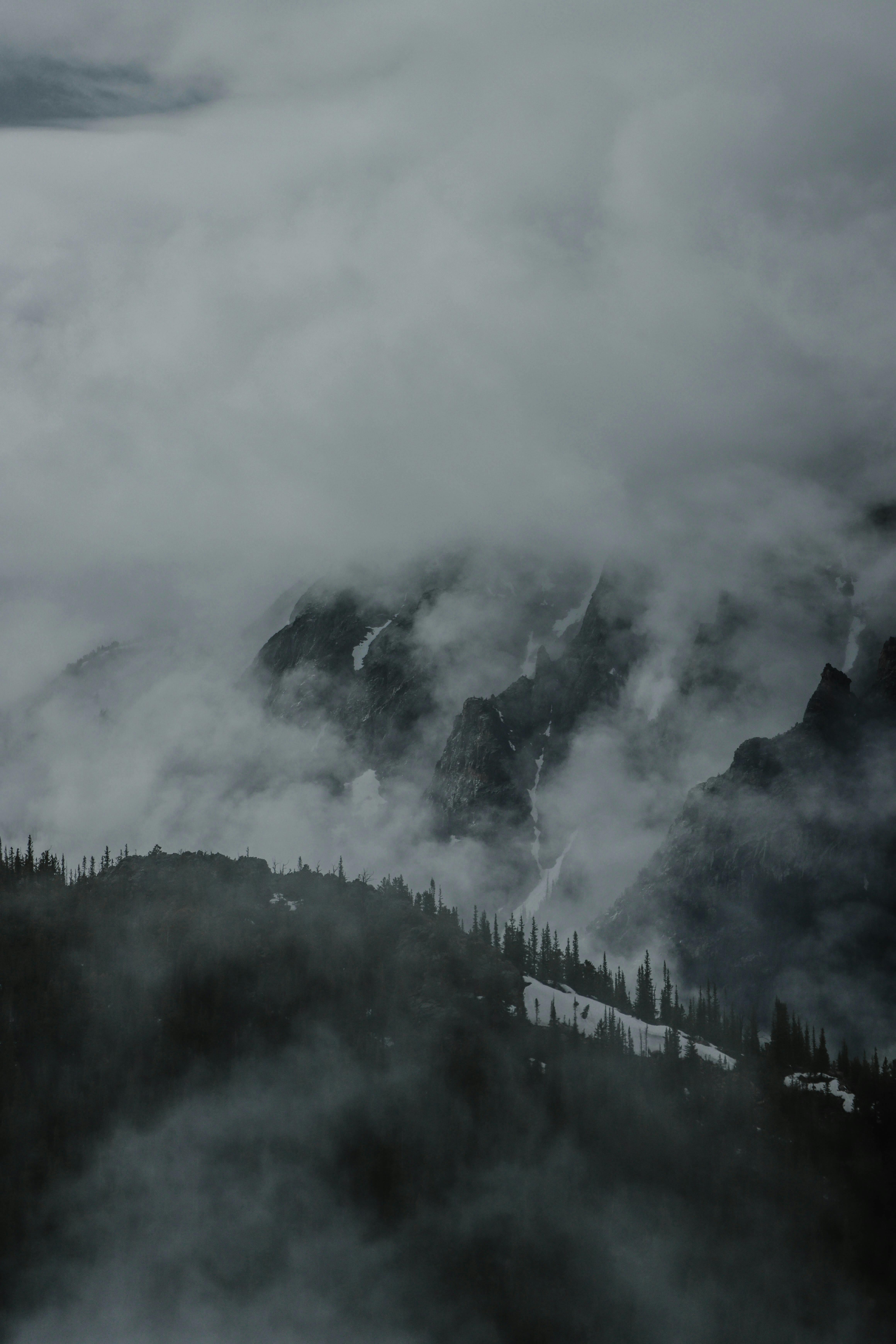 Clouds over Dark Rocky Mountain in Colorado, USA · Free Stock Photo