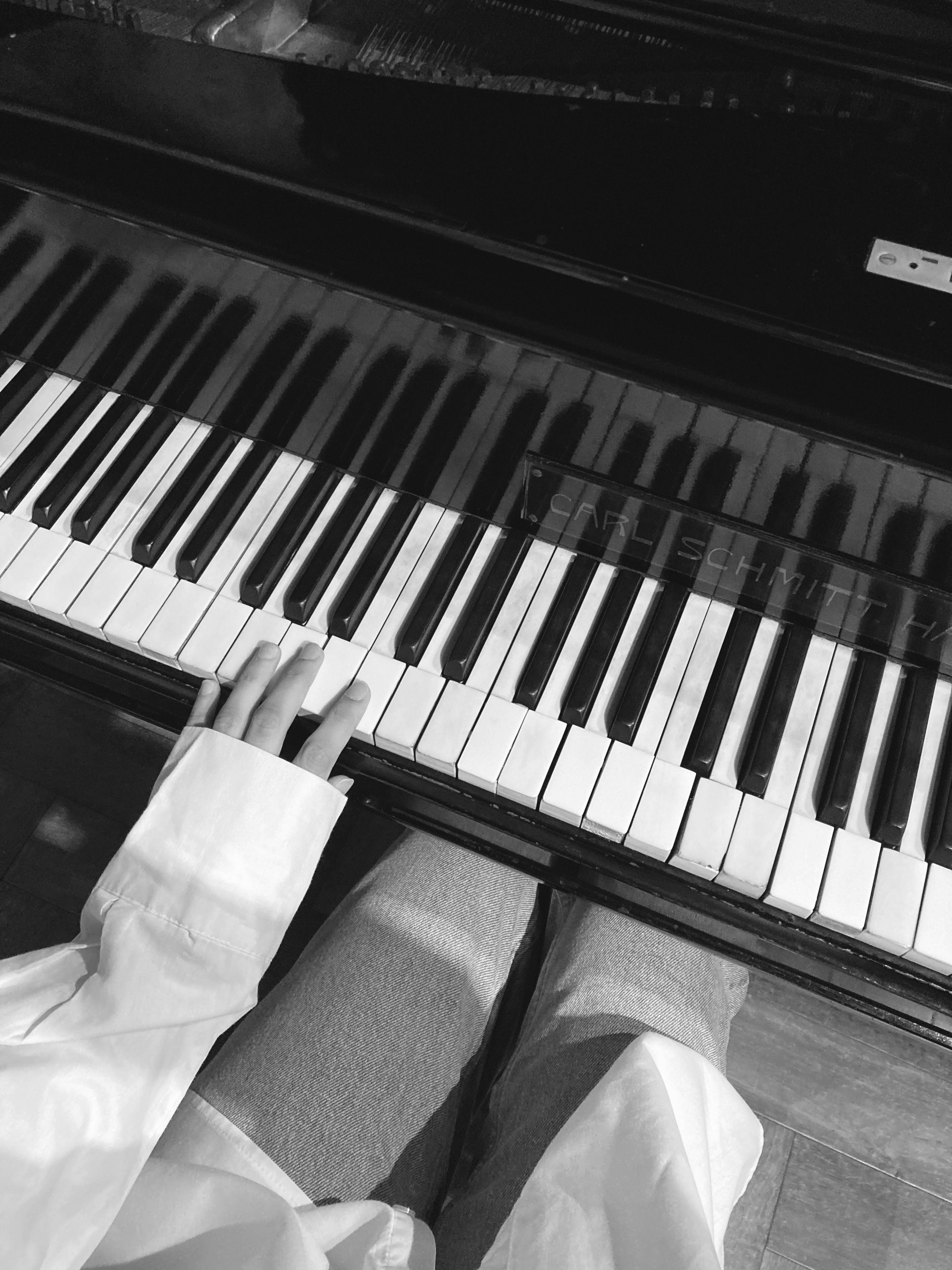 Person Holding Hand on Piano · Free Stock Photo