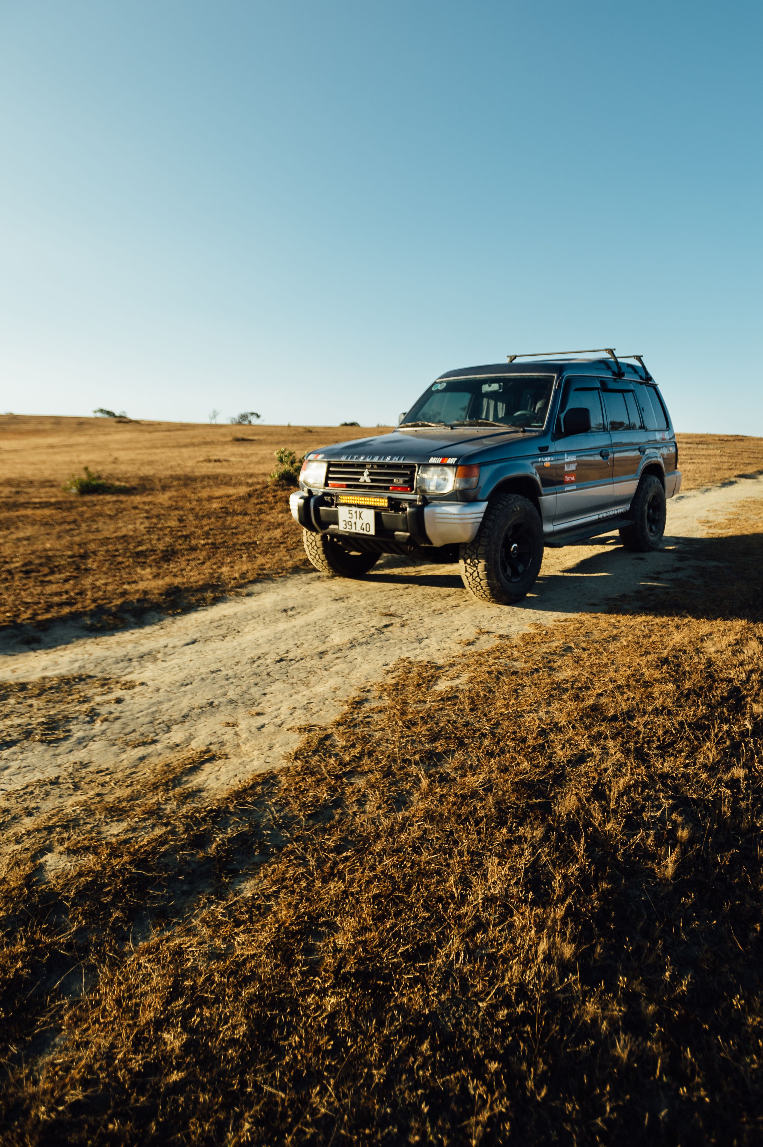 Mitsubishi Pajero On Dirt Road Free Stock Photo