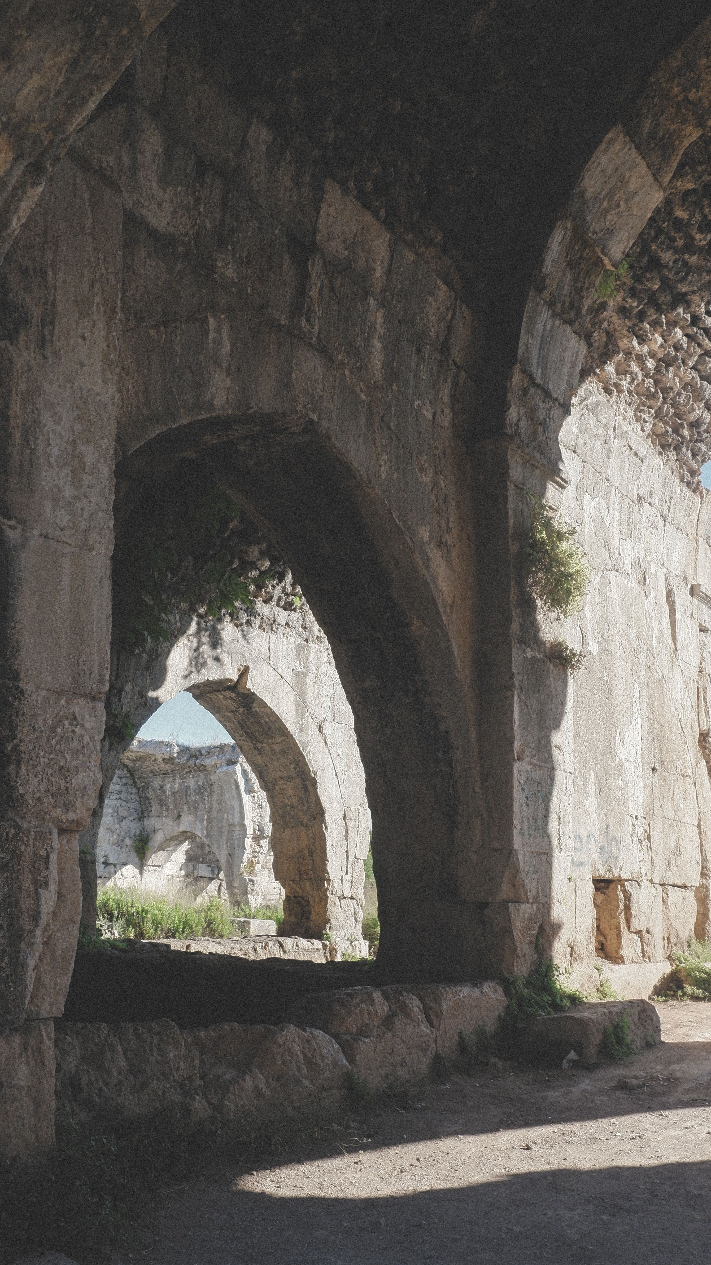 An Abandoned Stone Building with Half Arched Opening · Free Stock Photo