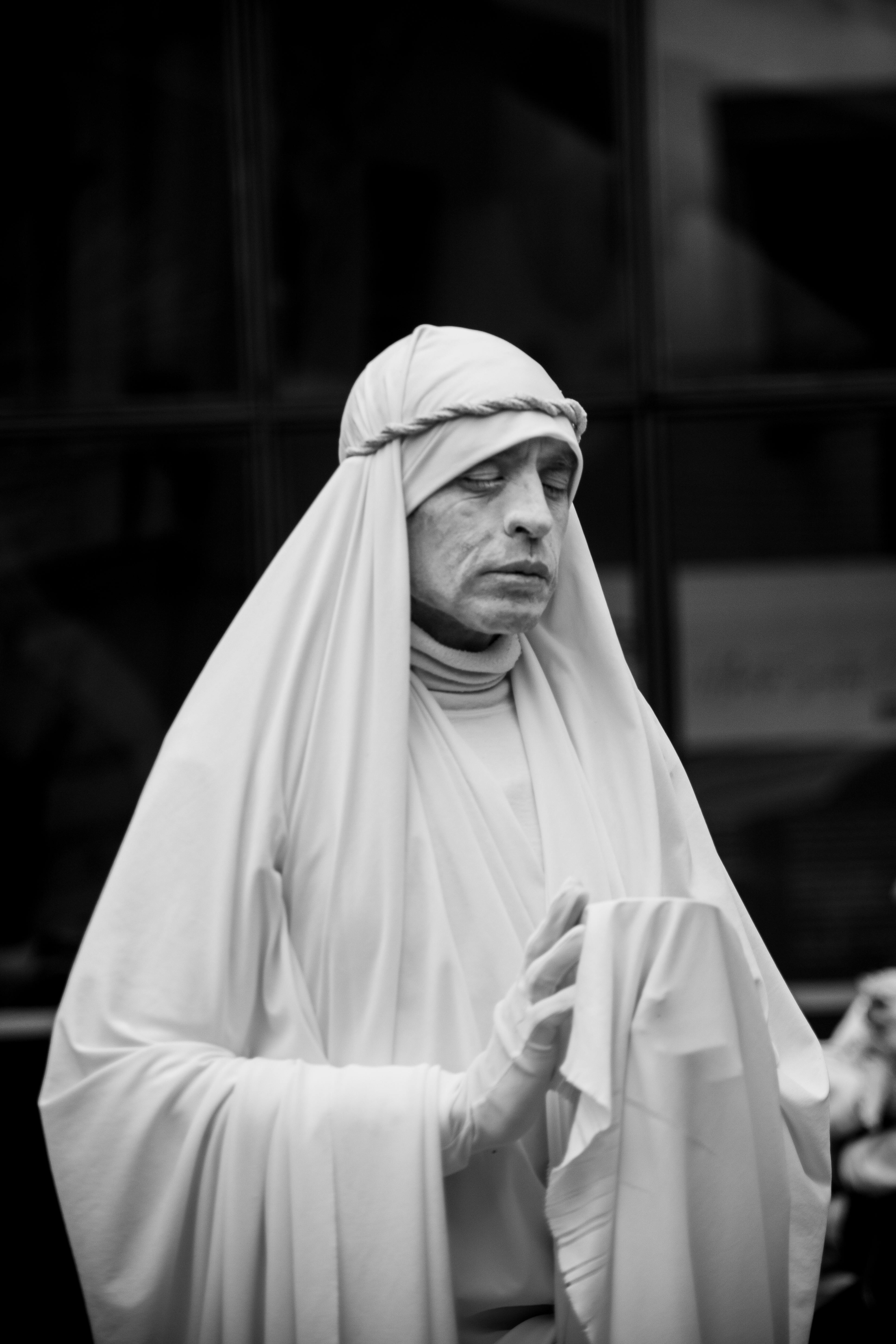 Man in Robes Standing with Eyes Closed · Free Stock Photo